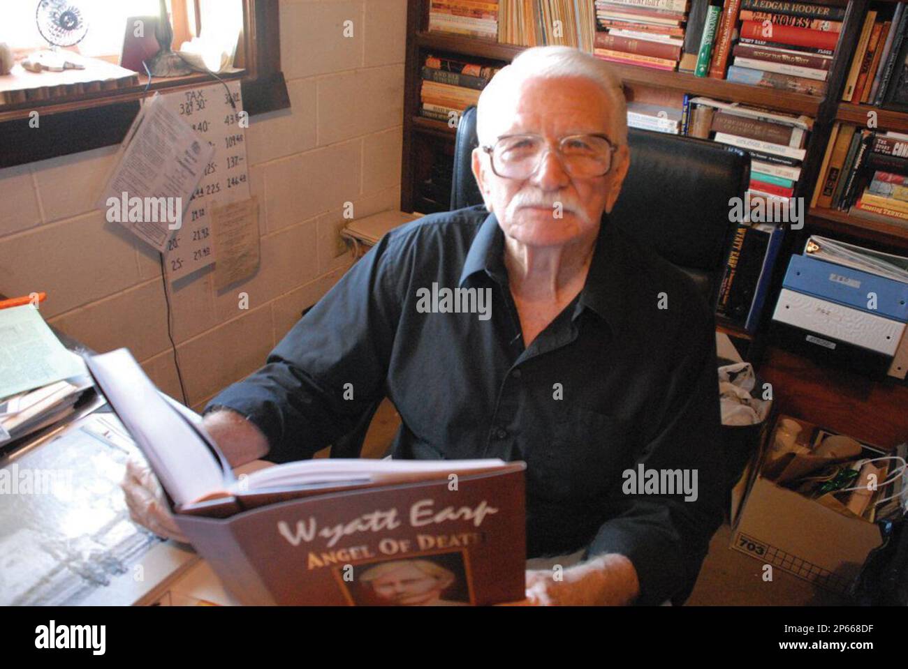 In this photo taken on Aug. 23, 2012, Ben Traywick sits at his desk at ...