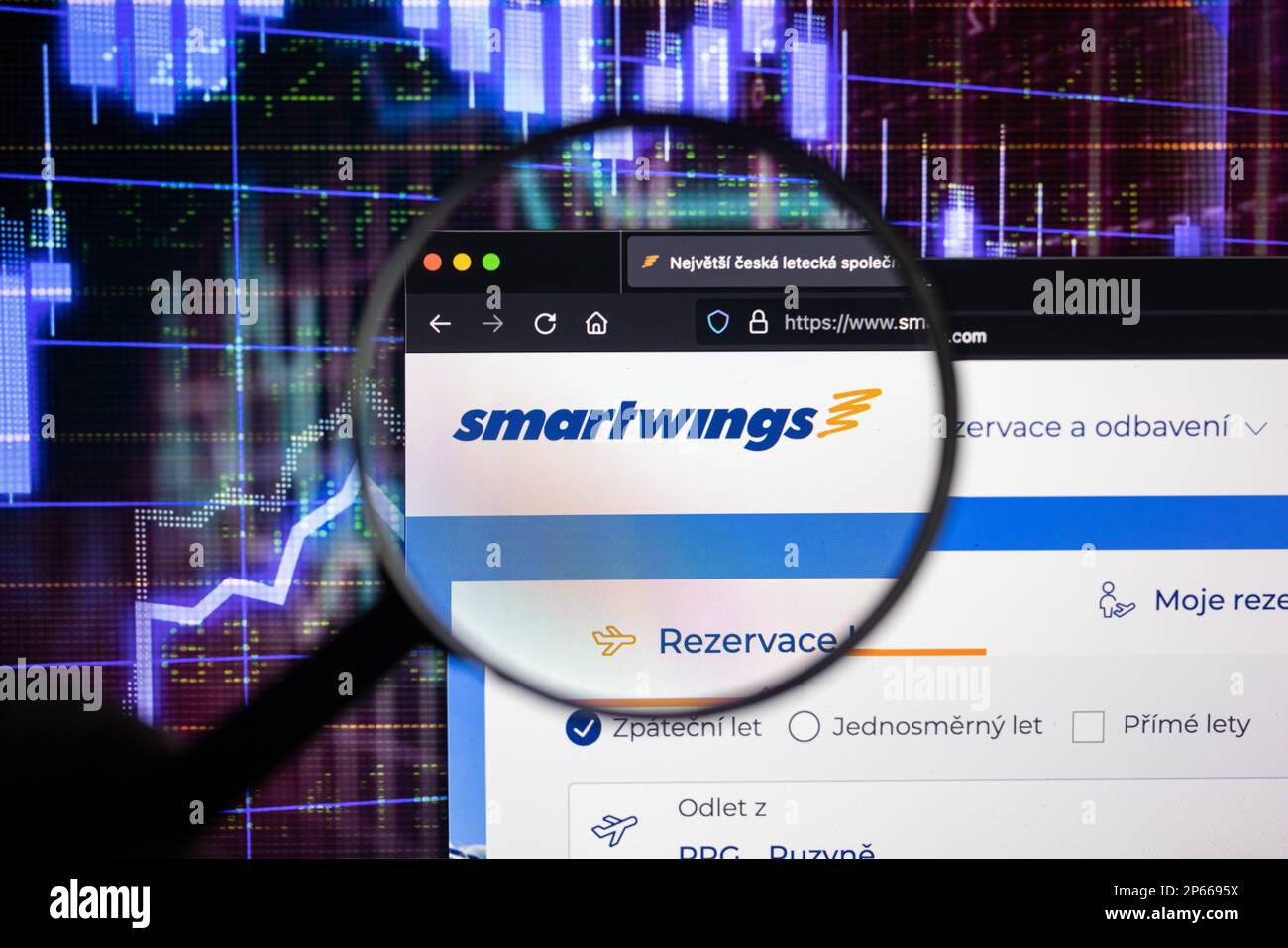 Smartwings airline company logo on a website with blurry stock market ...