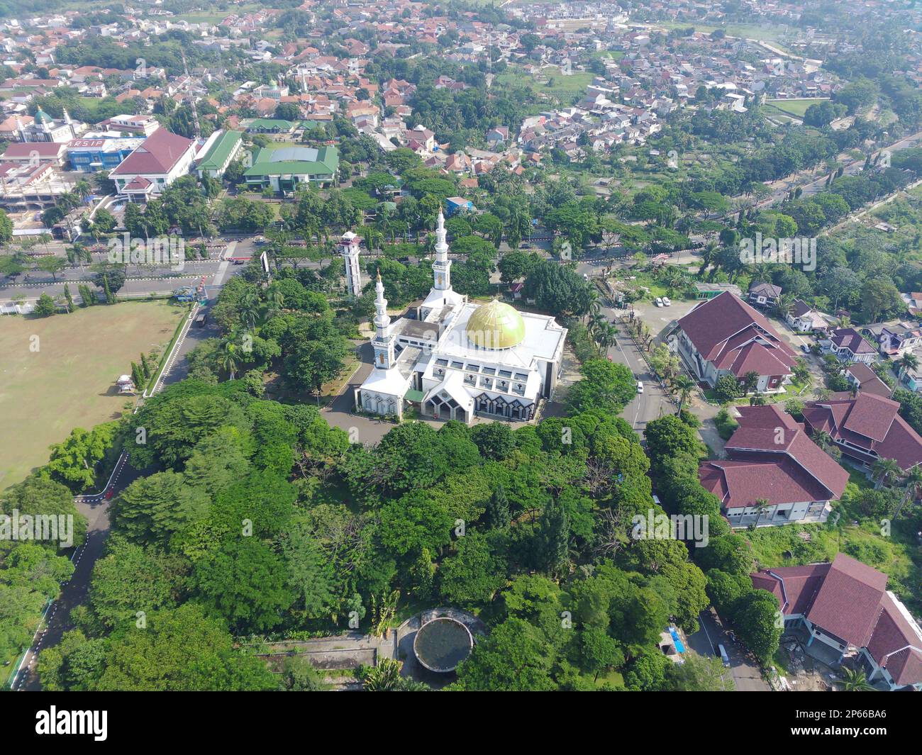 4K footage aerial view of the Baitul Faidzin Grand Mosque at noon in ...