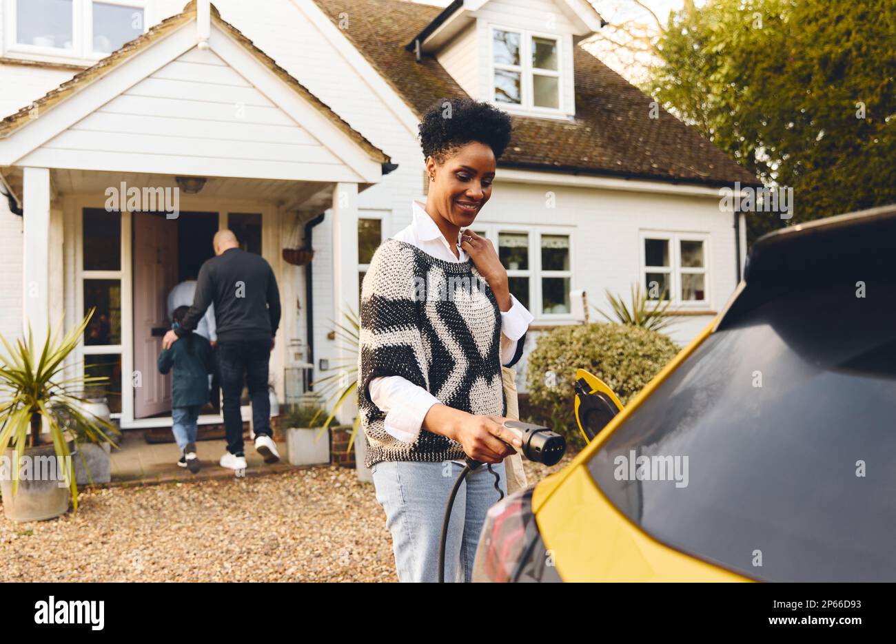 Woman plugging hi-res stock photography and images - Alamy