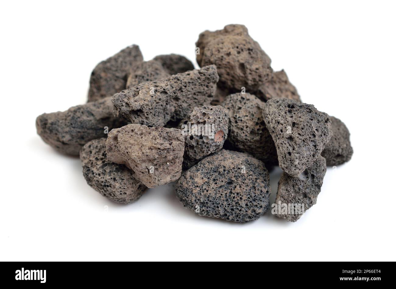 Porous black volcanic rock isolated on white background. Lava stone ...