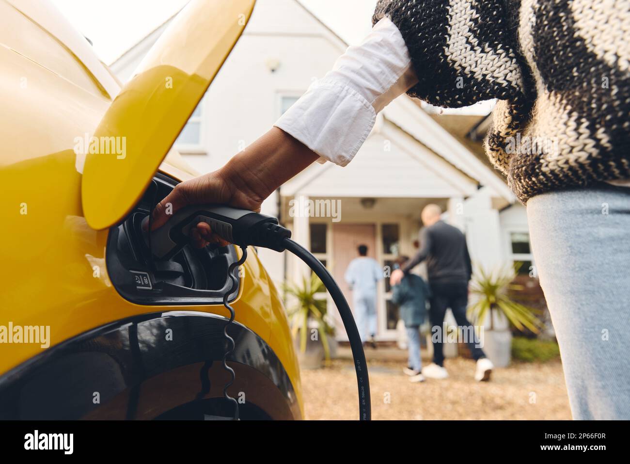 Woman plugging hi-res stock photography and images - Alamy