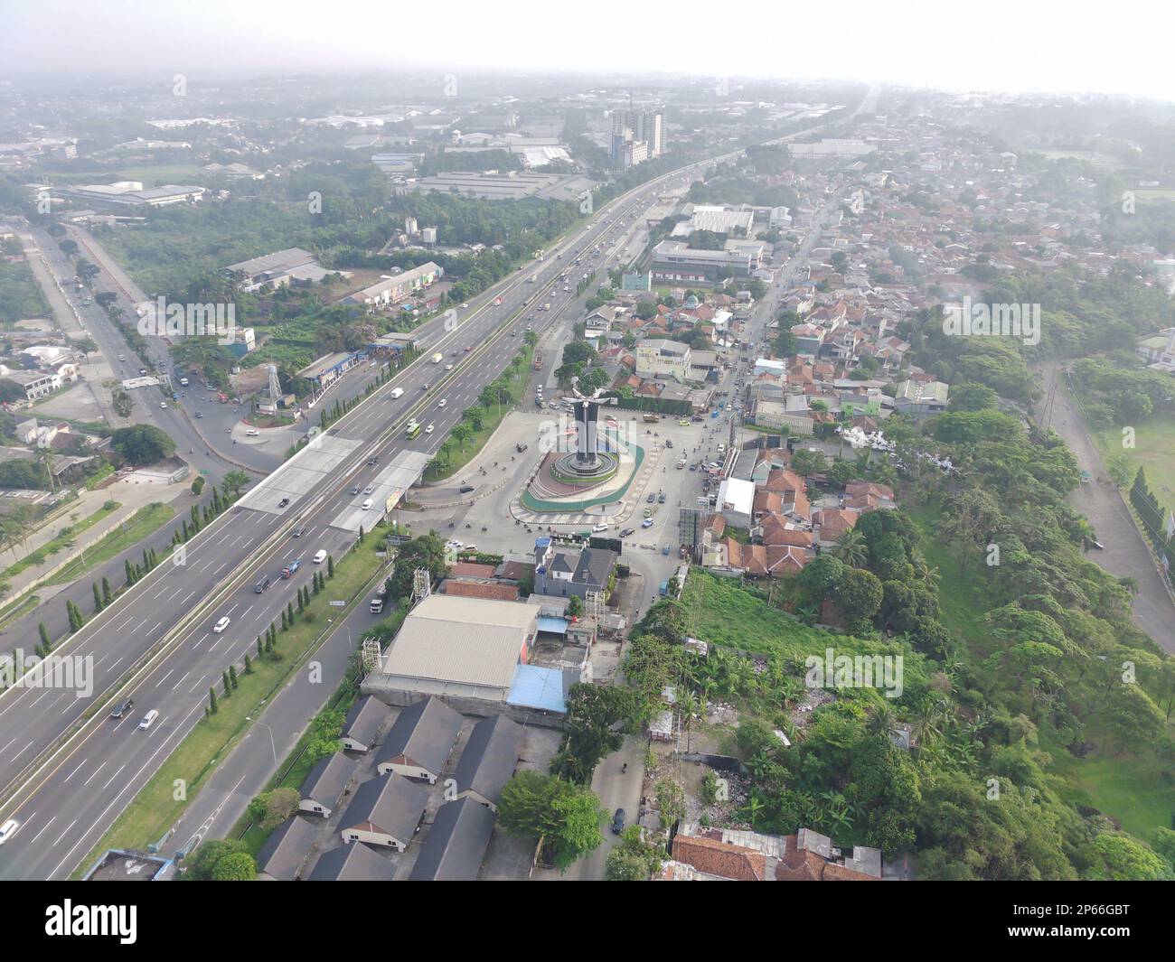 aerial view of Tugu Pancakarsa in the morning at the crossroads side by ...