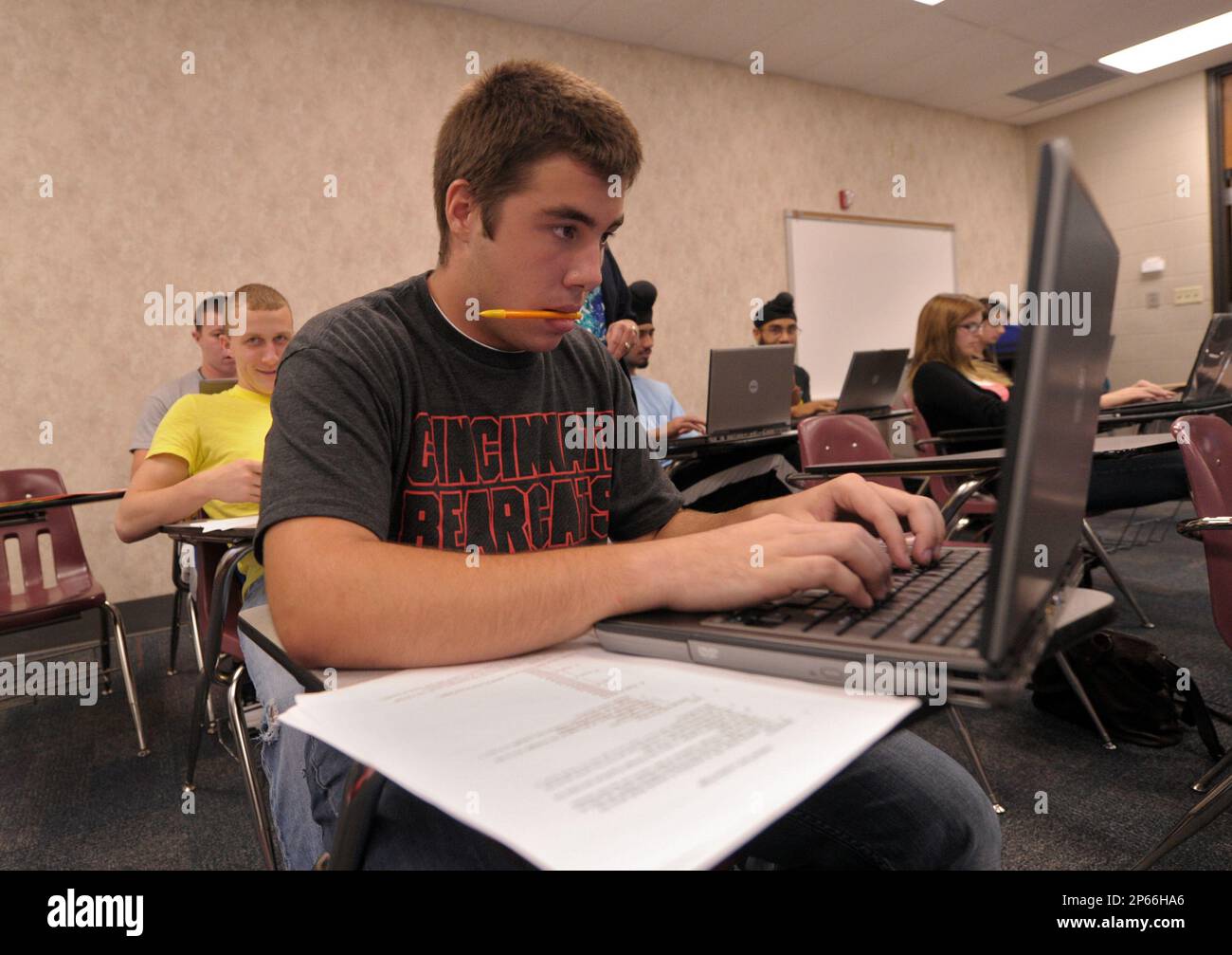 Senior Bryson, Davis, 17, works on an essay in a duel credit English class Thursday, Aug. 30 ...
