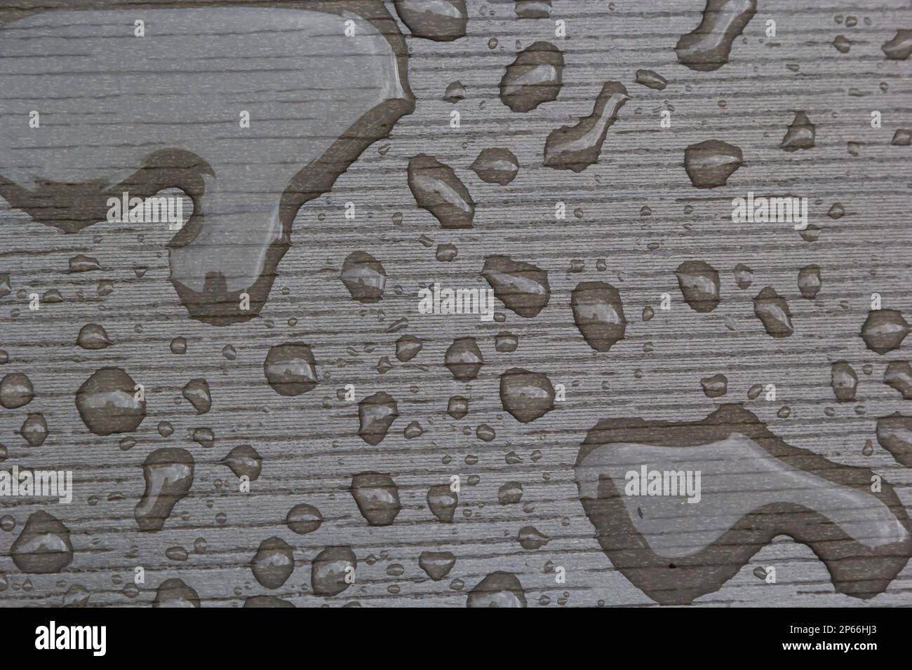 wet wooden planks of bench, background of wood texture with water drops ...
