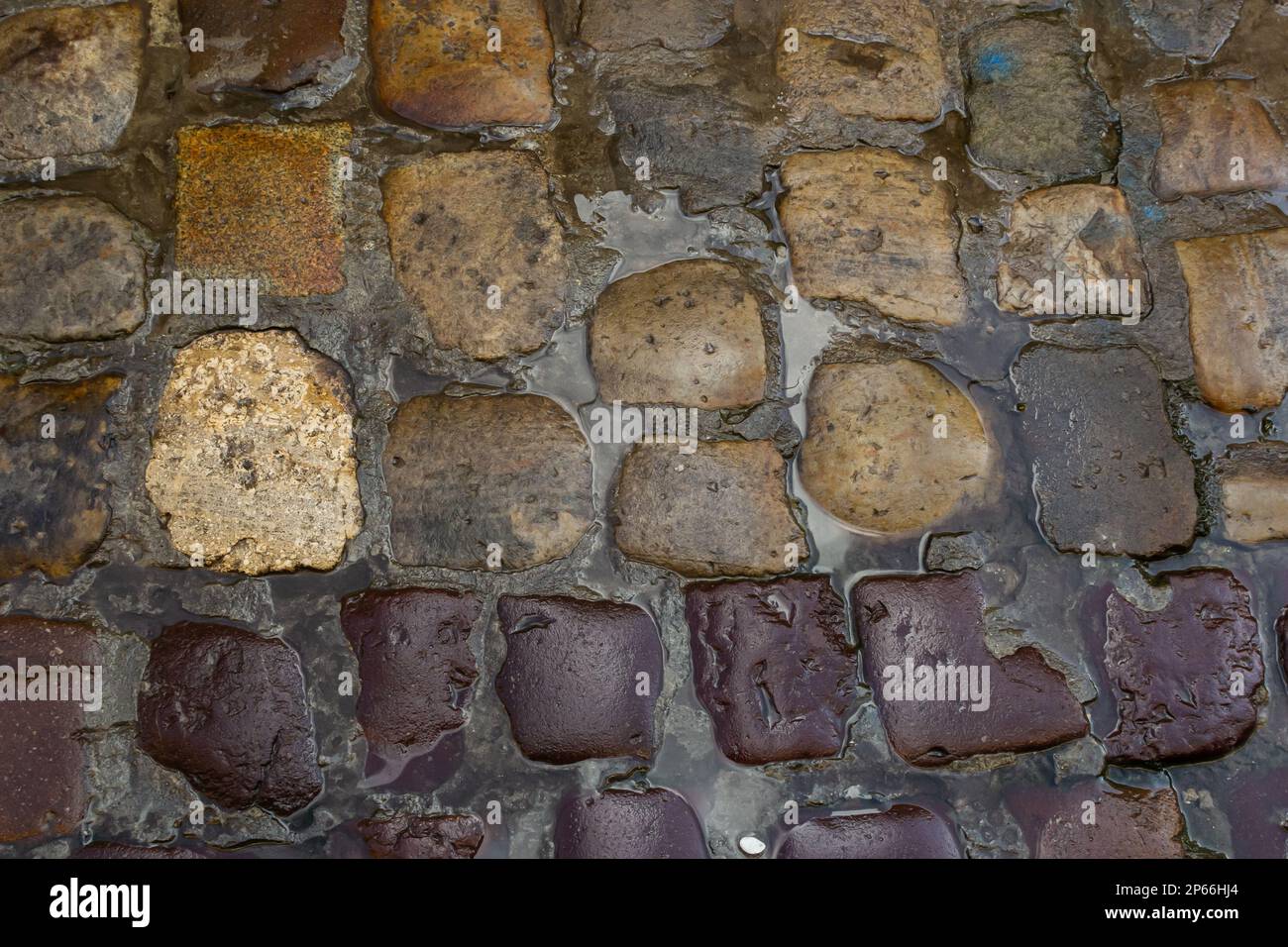 Granite dirty paving stones in the city. Road from paving stones for ...