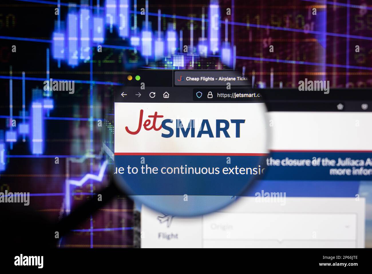 Jetsmart company logo on a website with blurry stock market ...