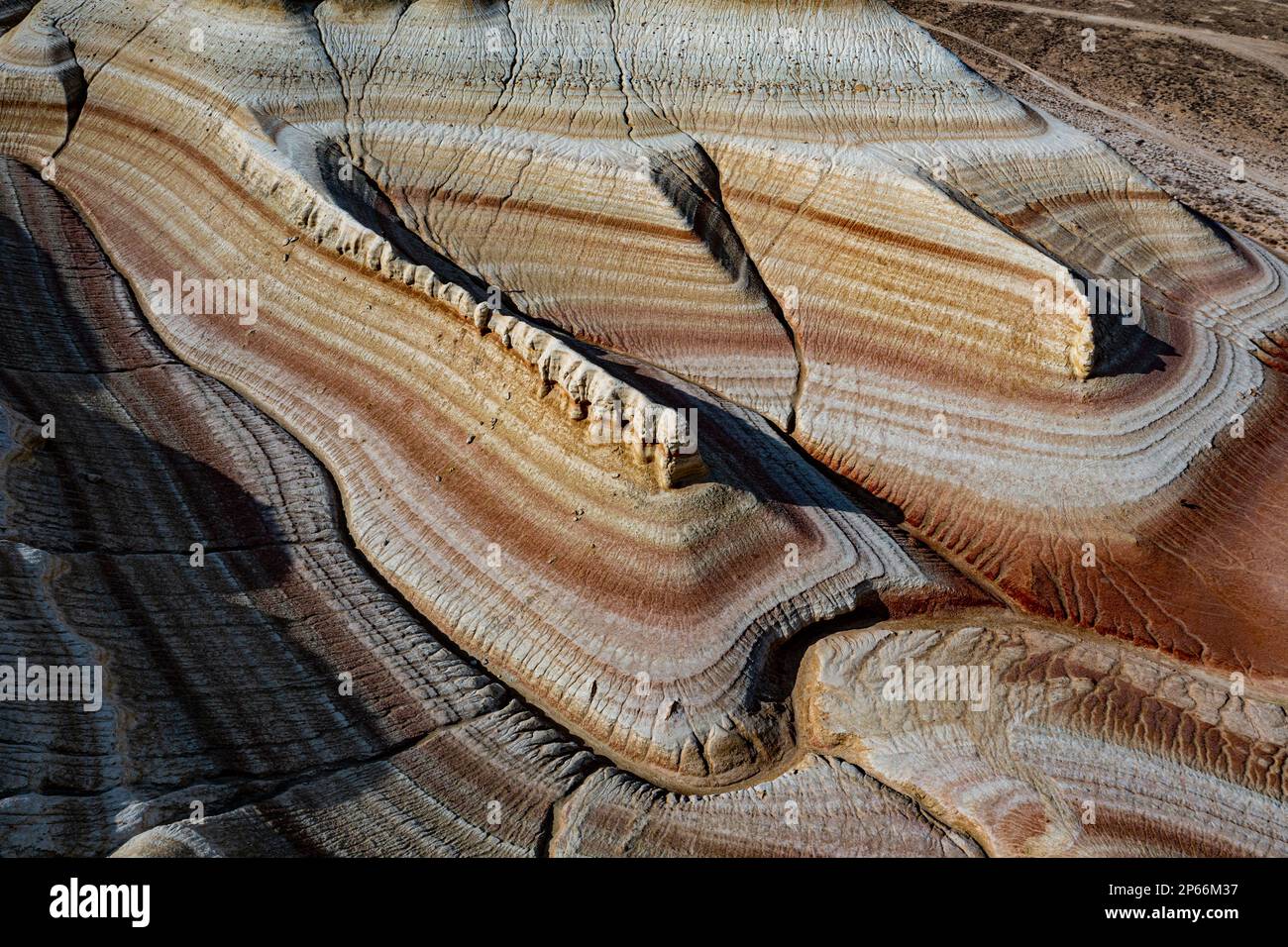 Aerial of multicoloured layers of sandstone, Kyzylkup, Mangystau ...