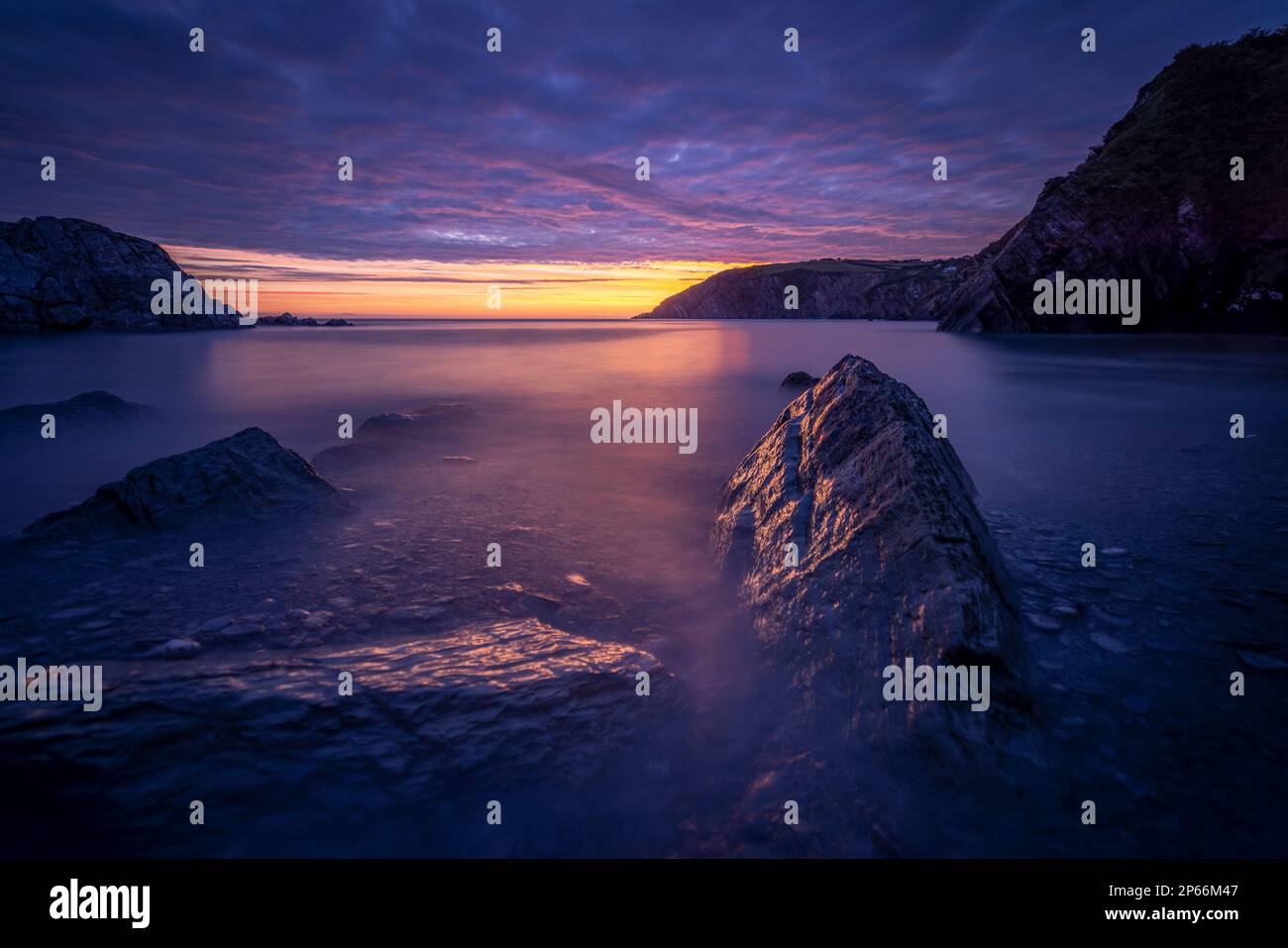 Dawn twilight with clouds at Sandy Bay, North Devon, England, United ...