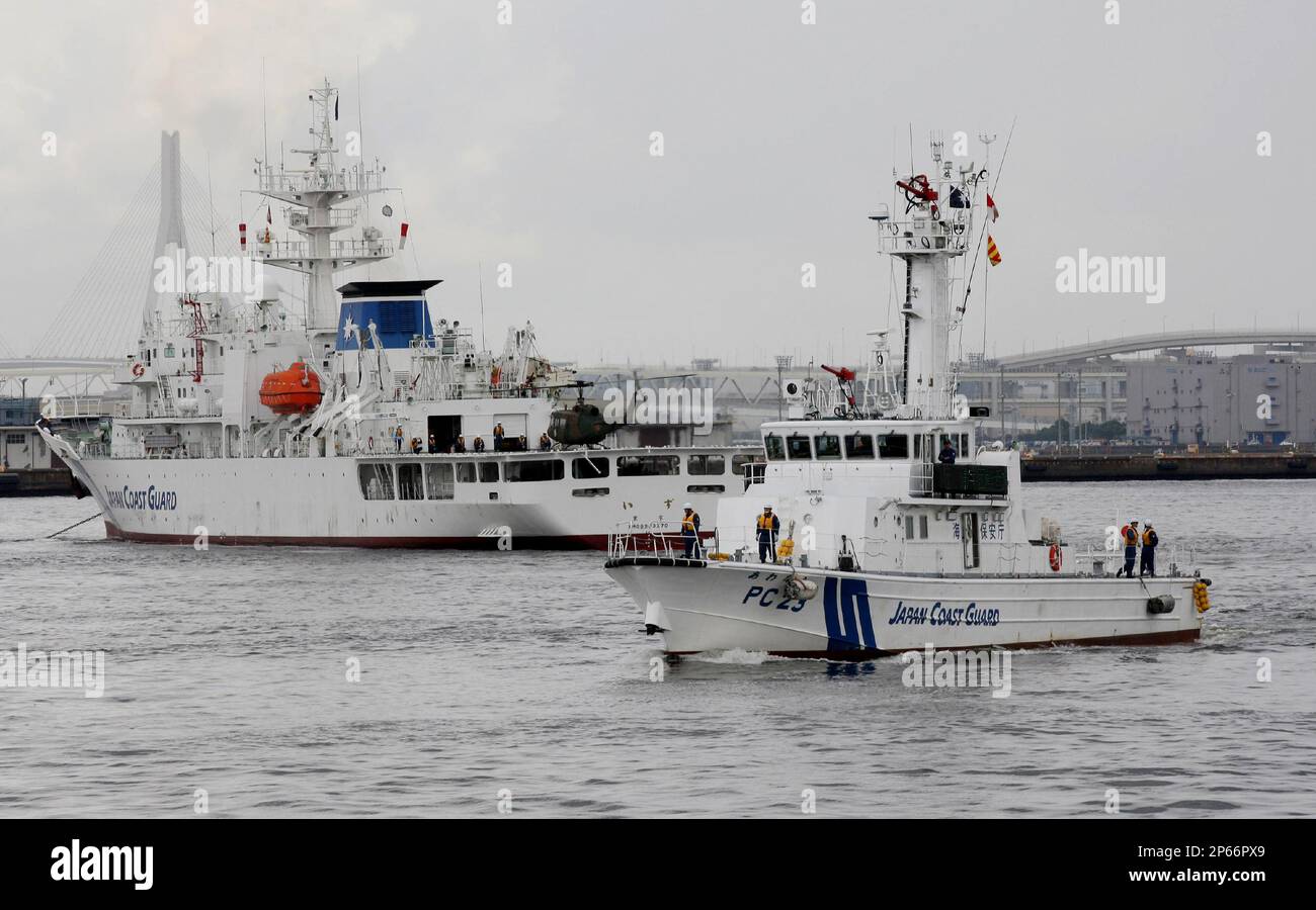 Japan Coast Guard vessels cruise off Yokoyama port during a disaster ...