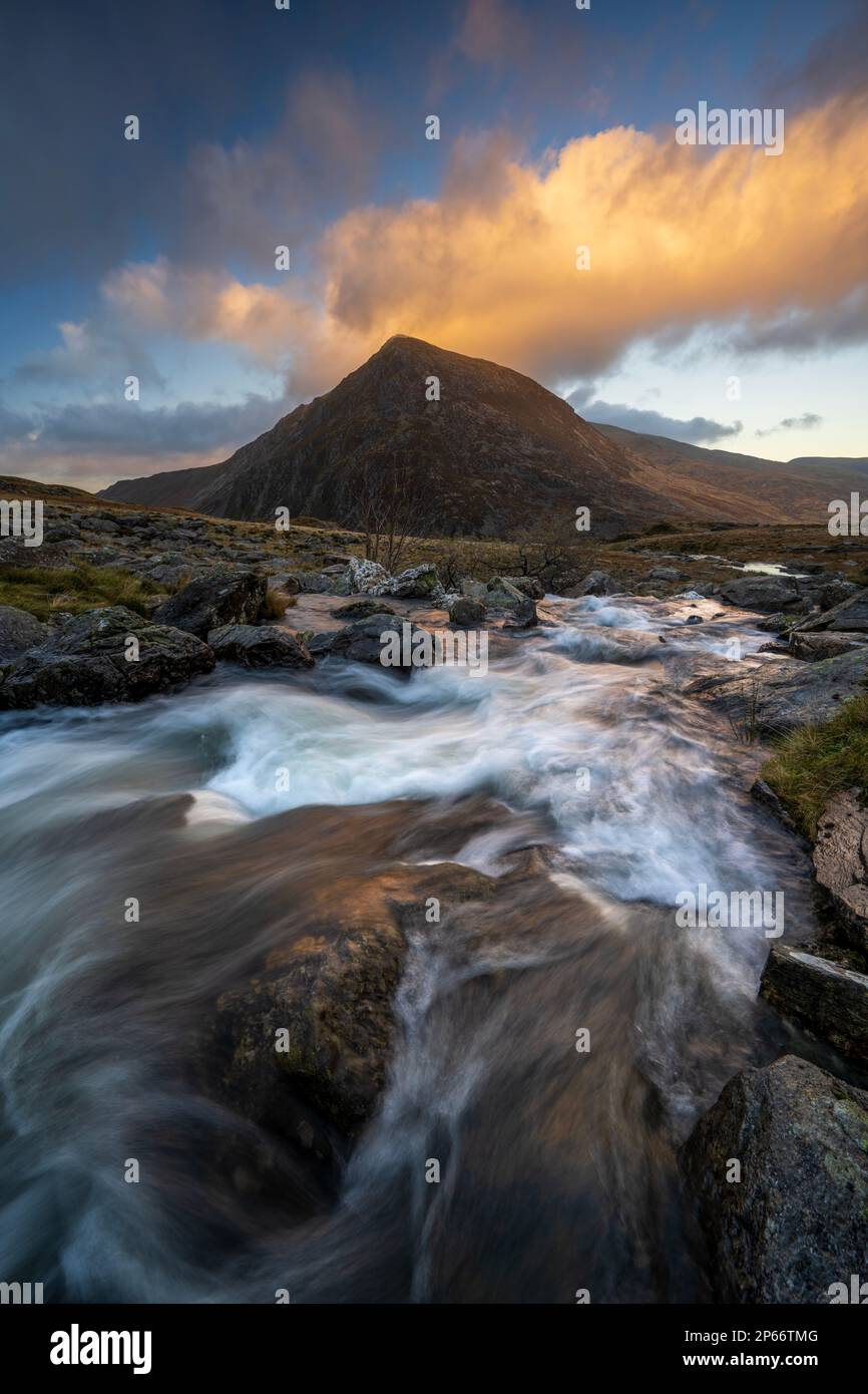 View of Tryfan with flowing river in Snowdonia National Park, Ogwen ...