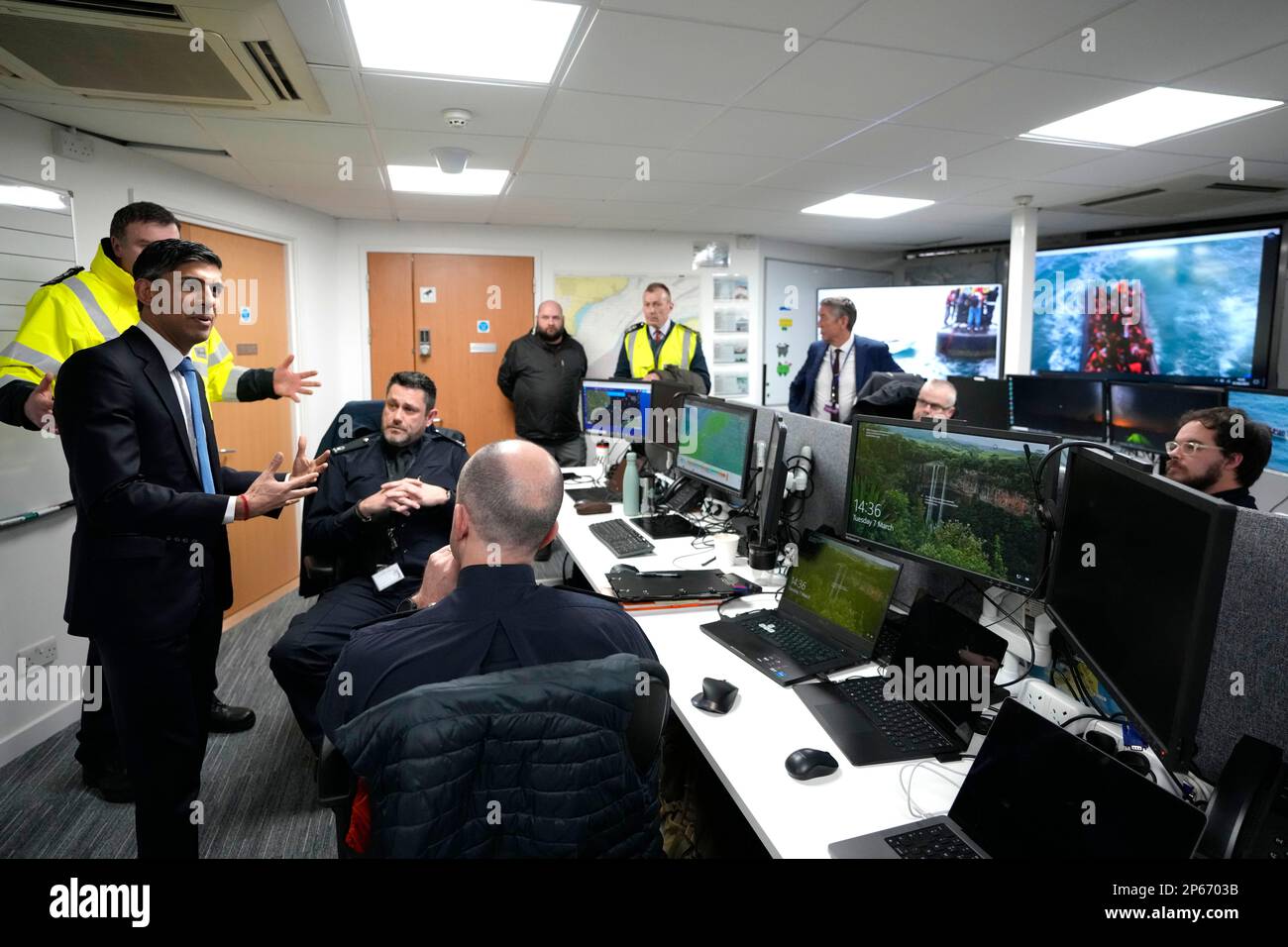 Prime Minister Rishi Sunak speaks with staff during a visit to the Home ...