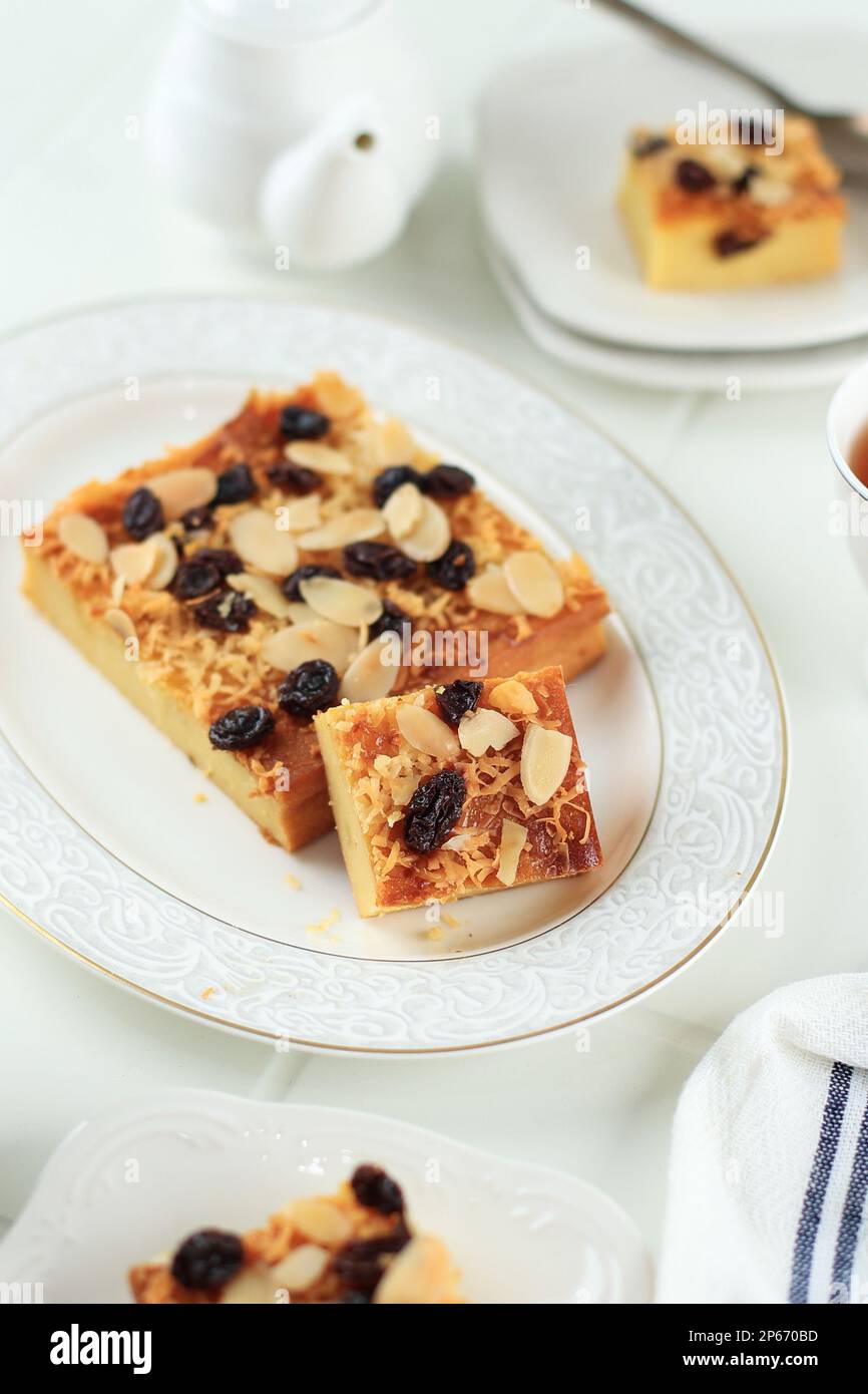 Sliced Homemade Prol Tape or Bolu Tapai on White Plate. Prol Tape is ...