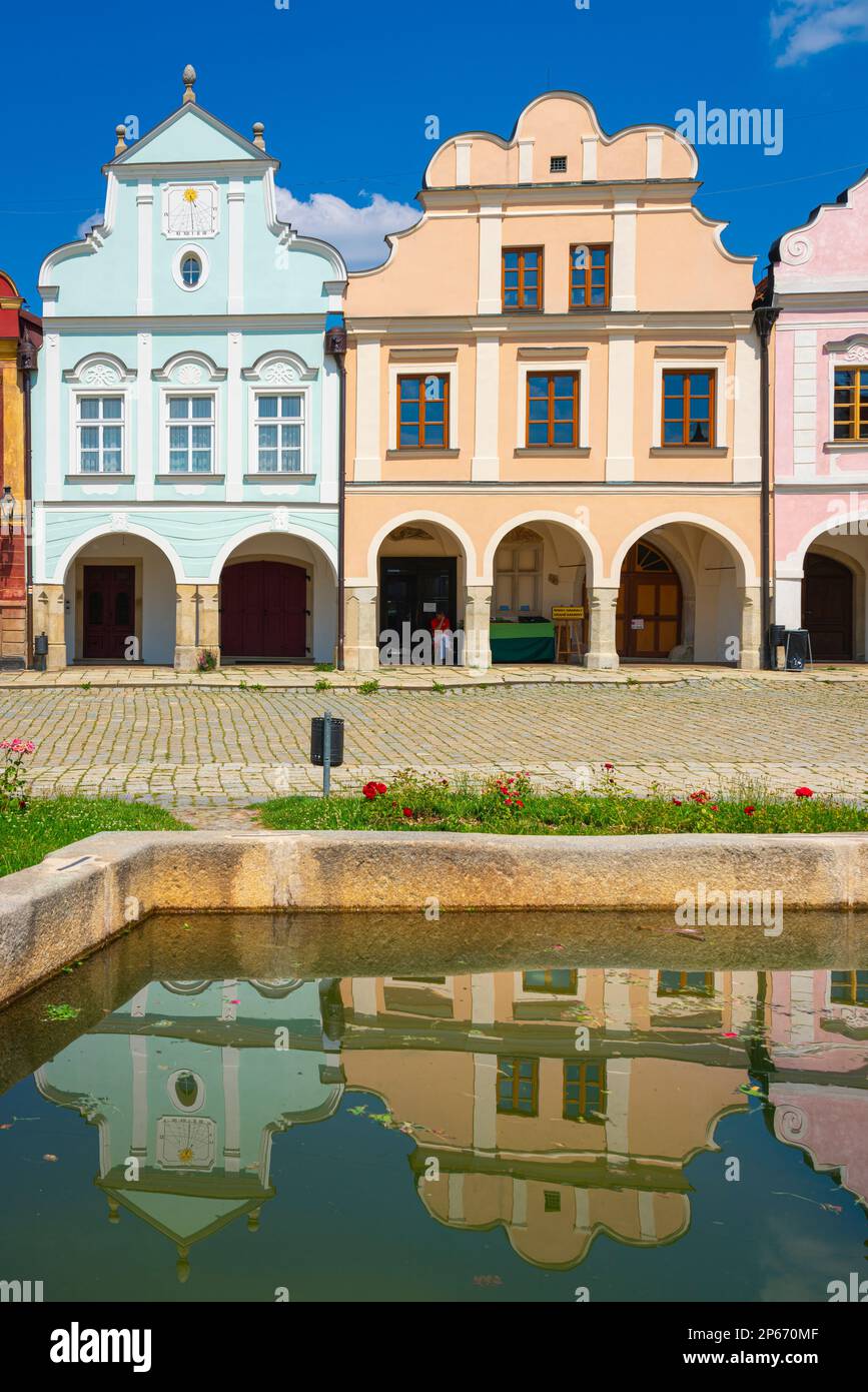 Iconic houses at Zacharias of Hradec Square reflecting in Horni kasna ...