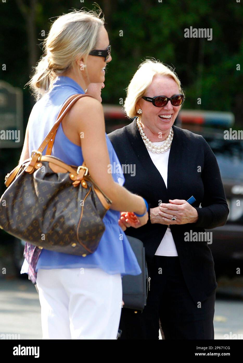 Relatives of victim Yeardly Love, mother Sharon Love, right, and sister ...
