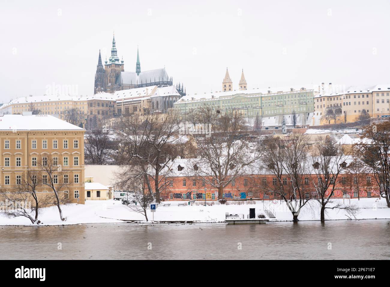 Prague Castle by Vltava River with snow in winter, Prague, Czech ...