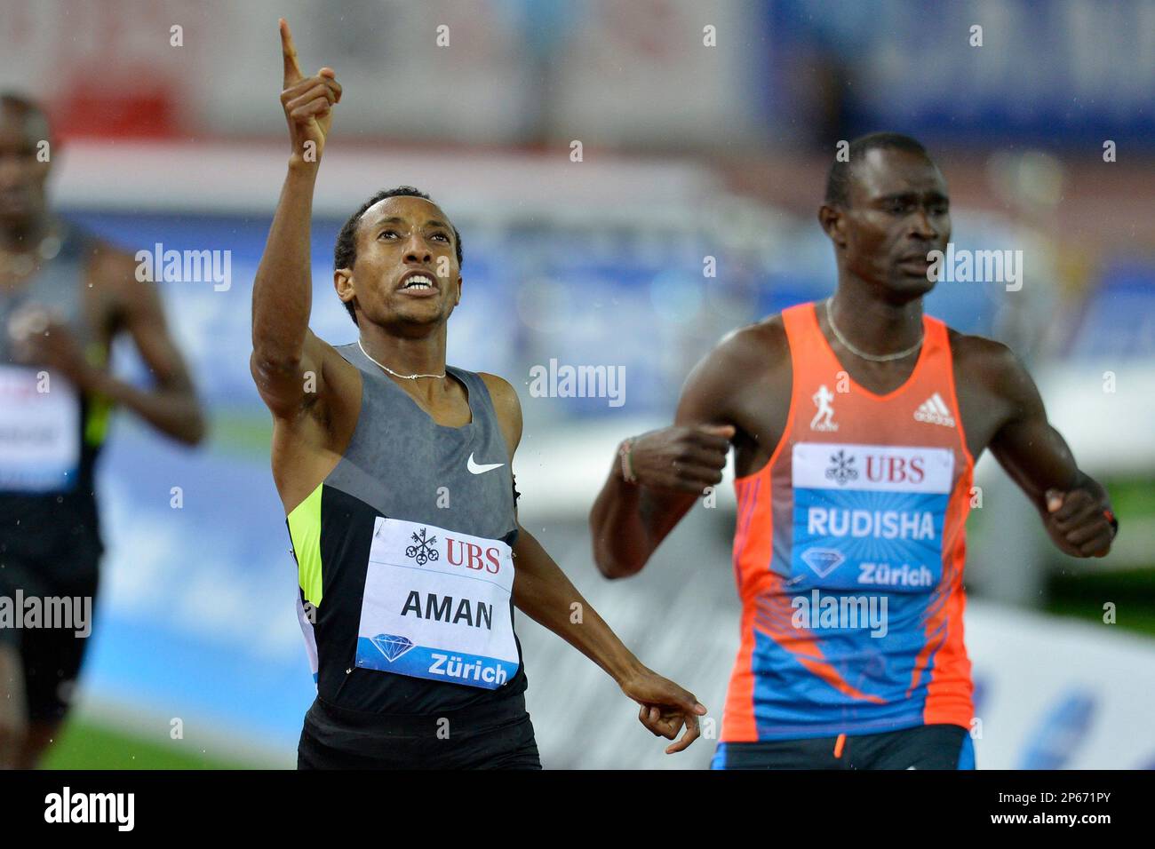 David Rudisha from Kenya, right, finishes 2nd against winner Mohamed ...