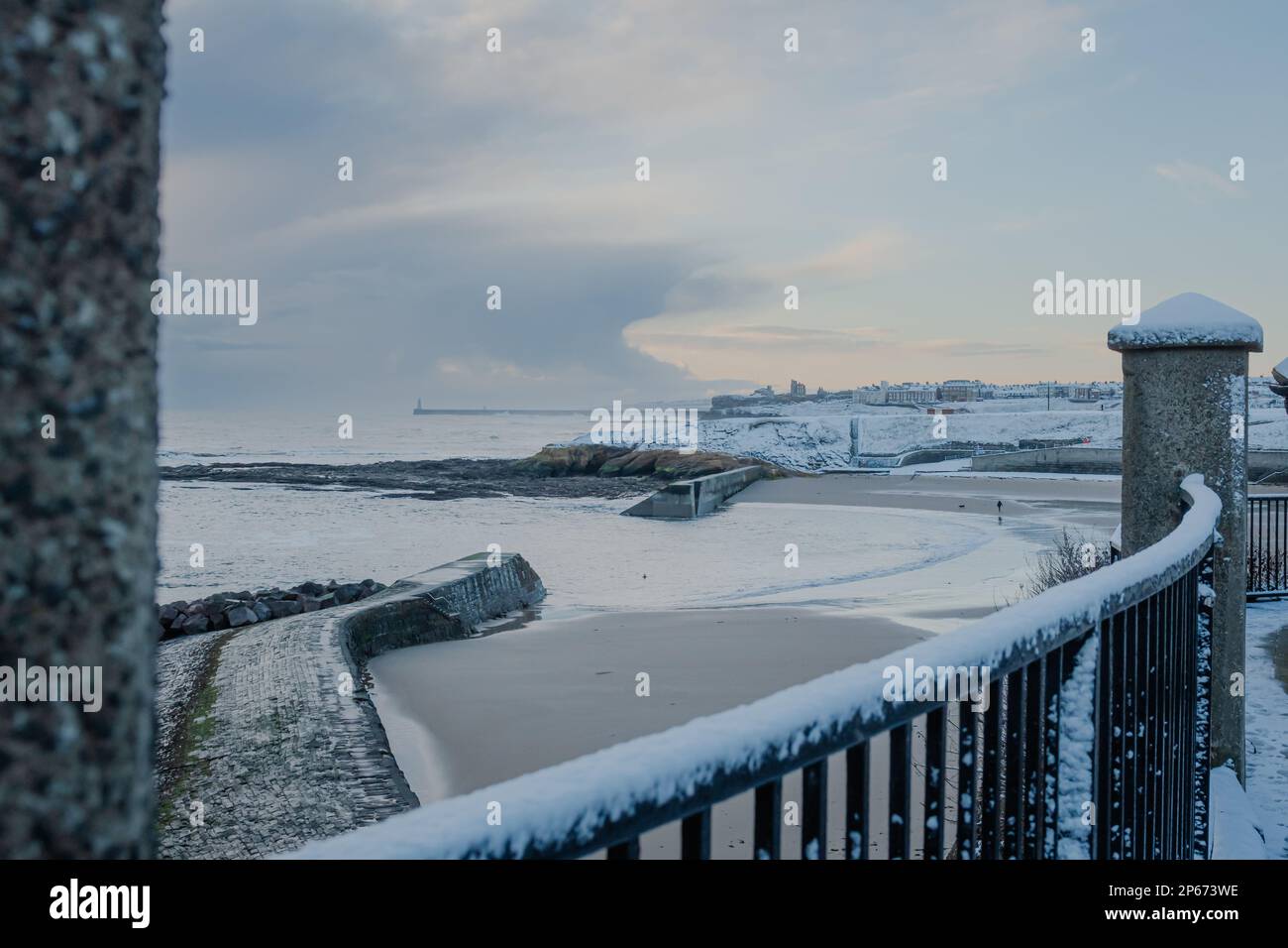 View of Cullercoats Harbour and beach covered in snow Stock Photo - Alamy