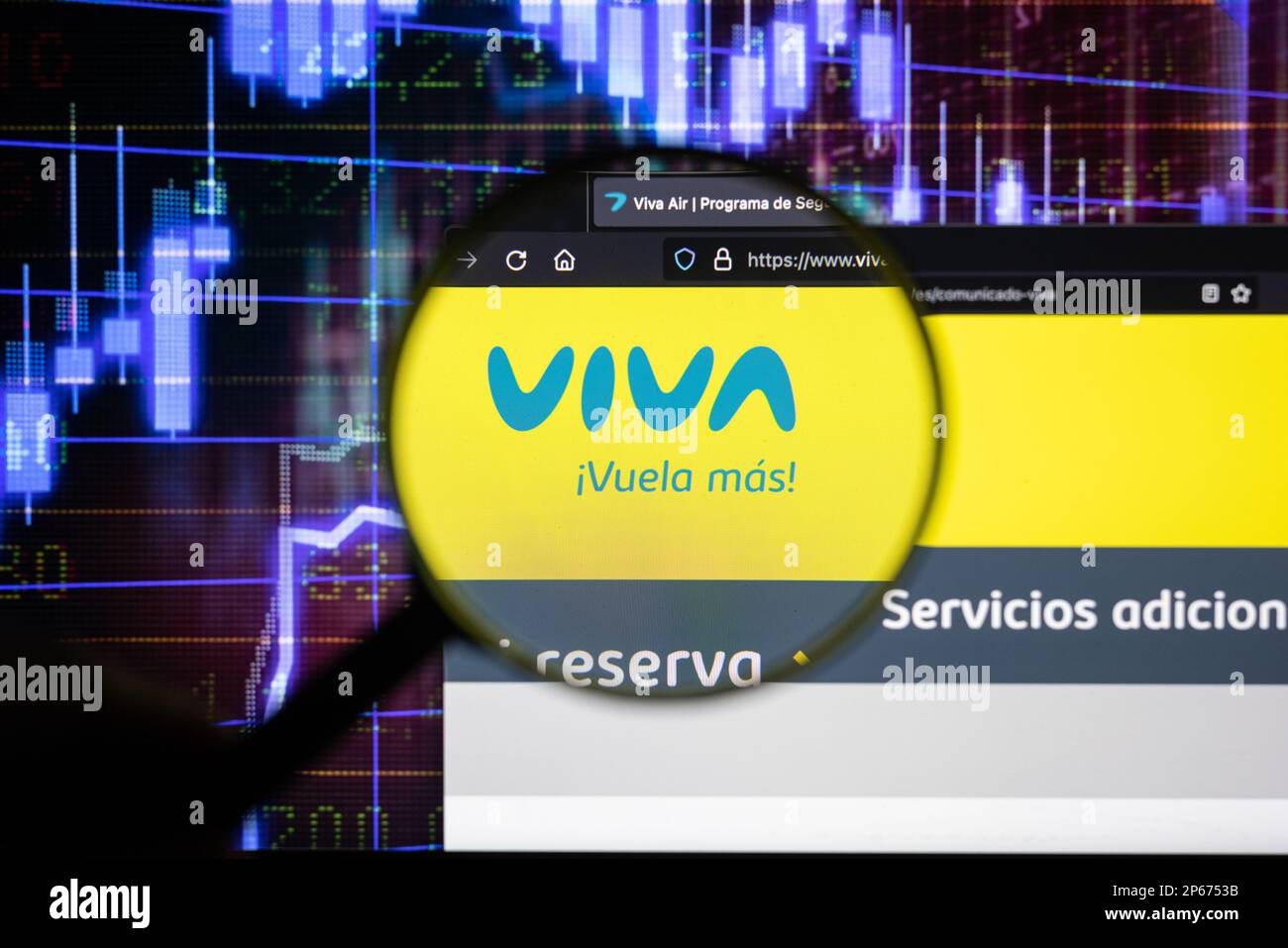 Viva airlines company logo on a website with blurry stock market ...