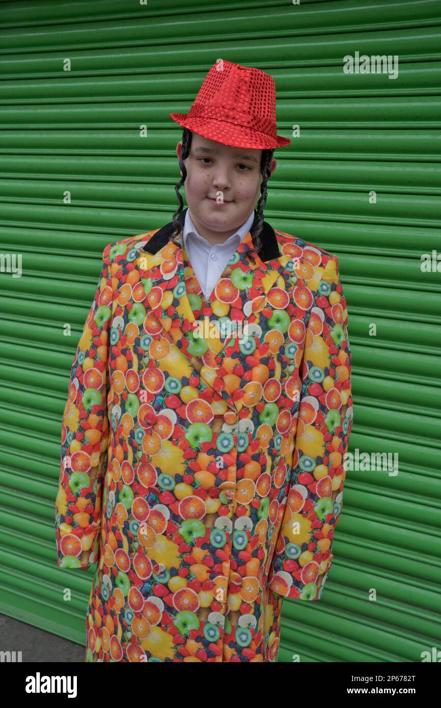 Children in fancy dresses and costumes to celebrate Jewish Purim ...