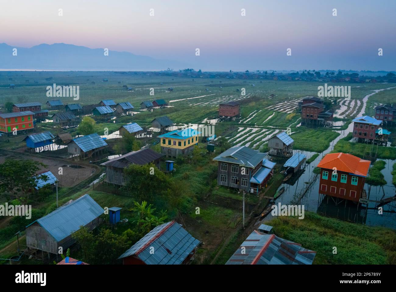 Aerial view of village and floating gardens before sunrise, Lake Inle ...