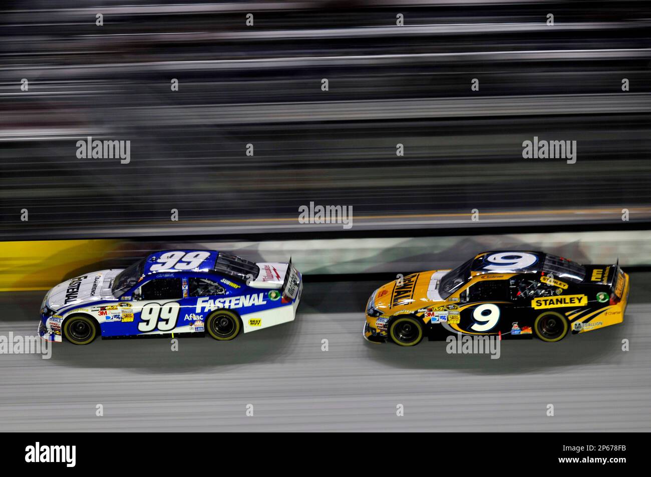 Carl Edwards (99) and Marcos Ambrose (9) during the NASCAR Sprint Cup ...