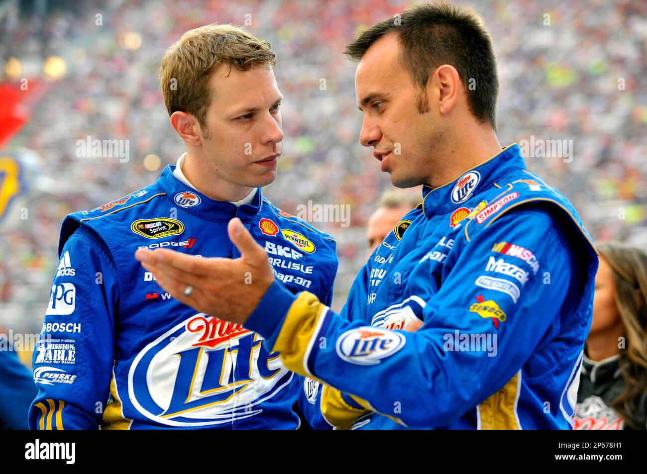 Brad Keselowski (left) and Paul Wolfe (right) during the NASCAR Sprint ...