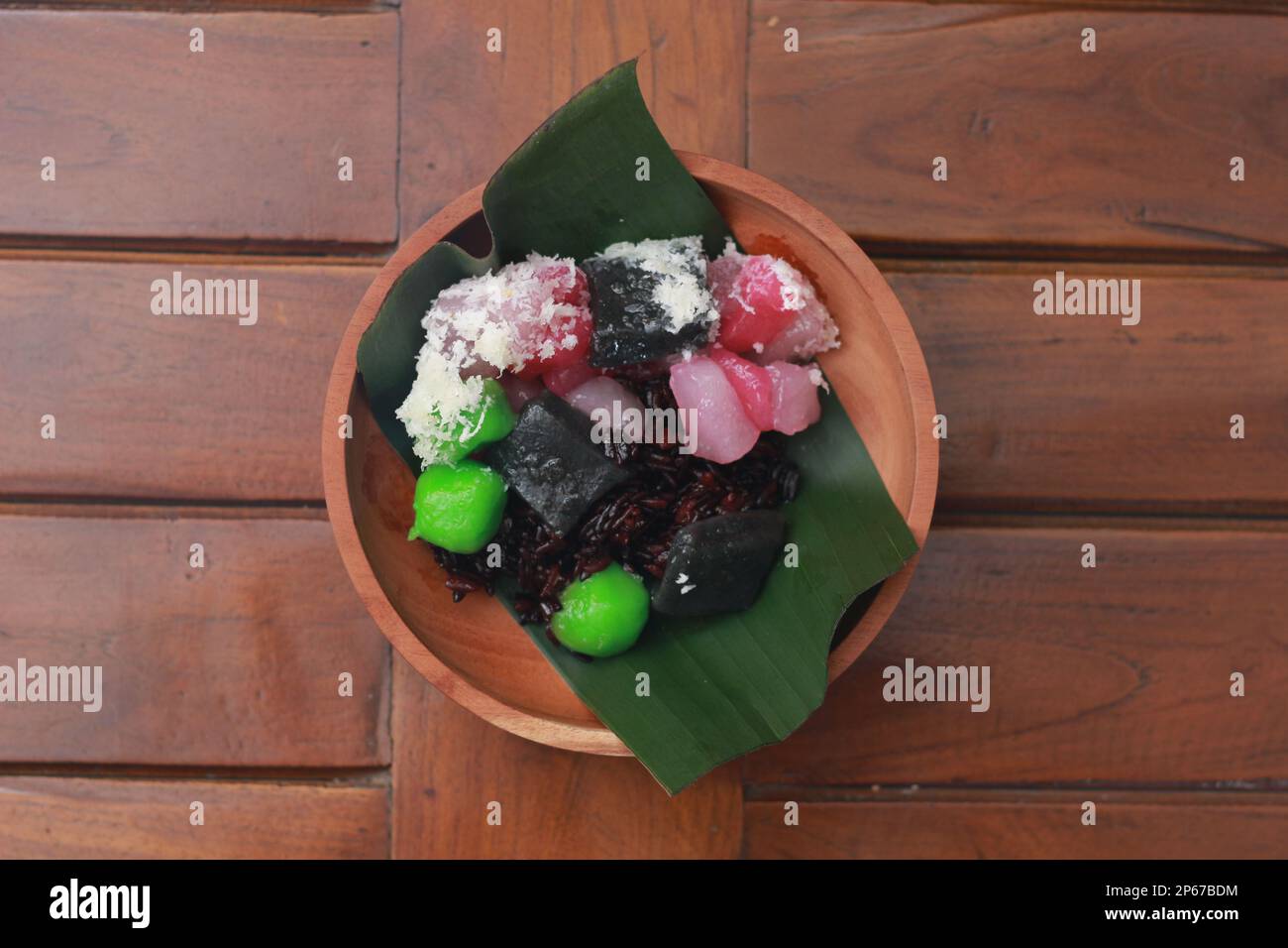 a close up of a traditional Indonesian food called Cenil. has a bright ...