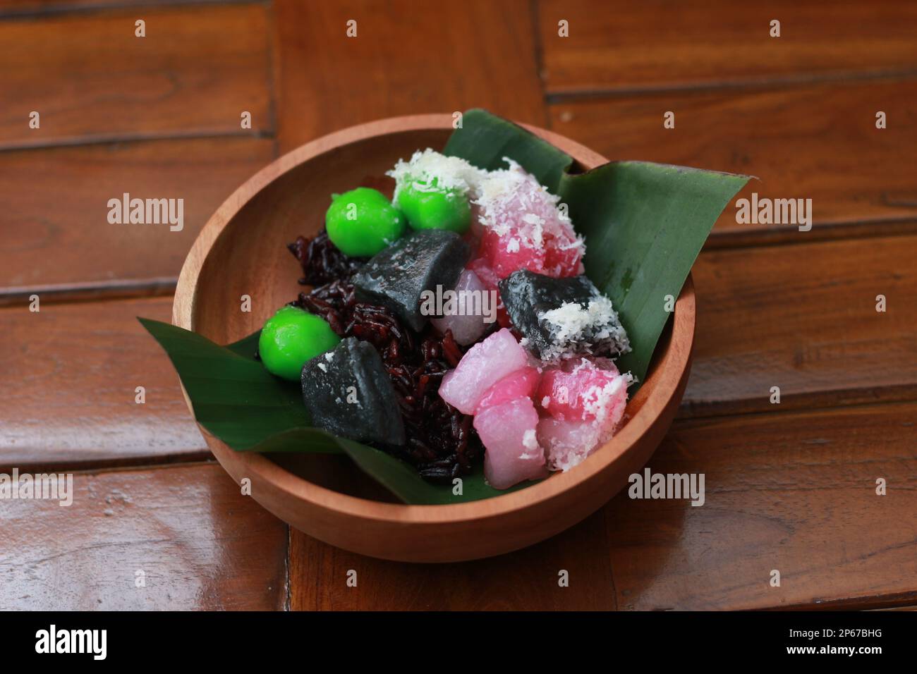 a close up of a traditional Indonesian food called Cenil. has a bright ...