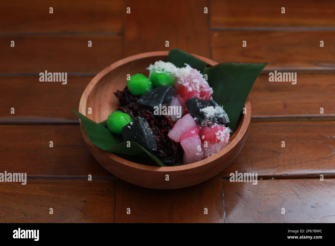 a close up of a traditional Indonesian food called Cenil. has a bright ...