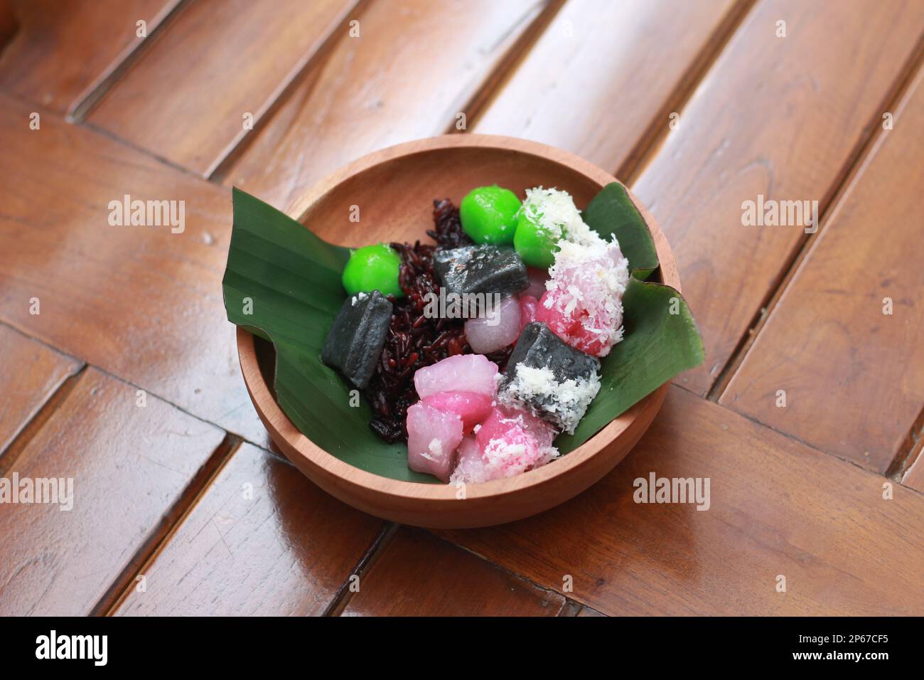 a close up of a traditional Indonesian food called Cenil. has a bright ...