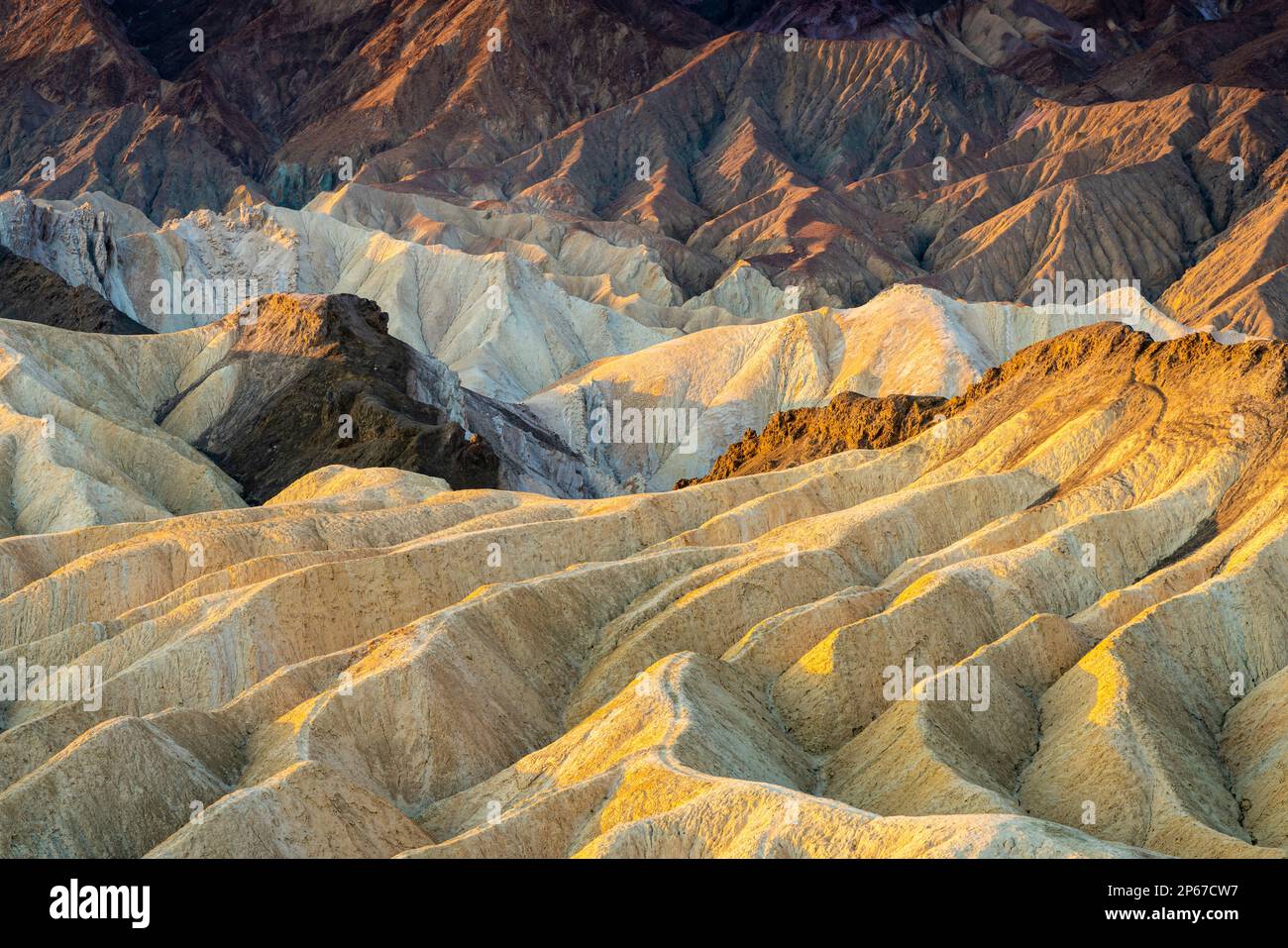 Full frame abstract shot of natural rock formations at Zabriskie Point ...