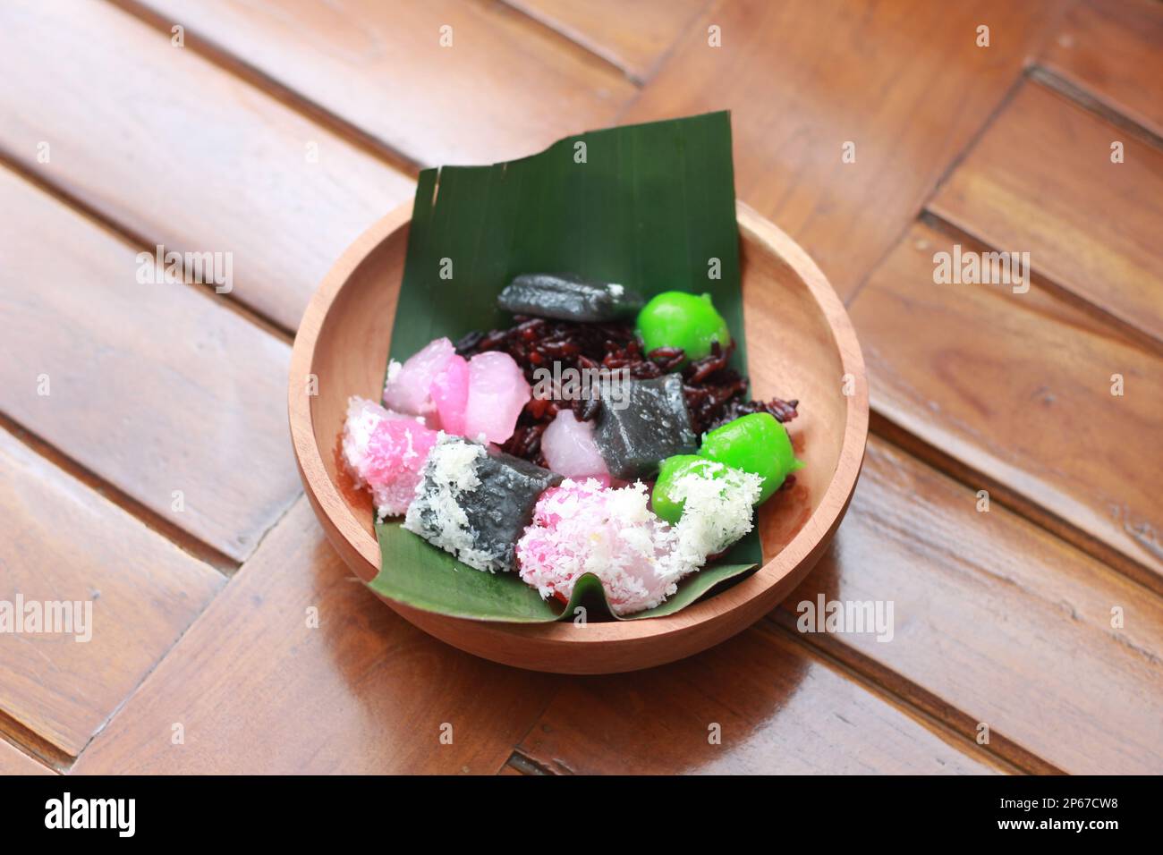 a close up of a traditional Indonesian food called Cenil. has a bright ...