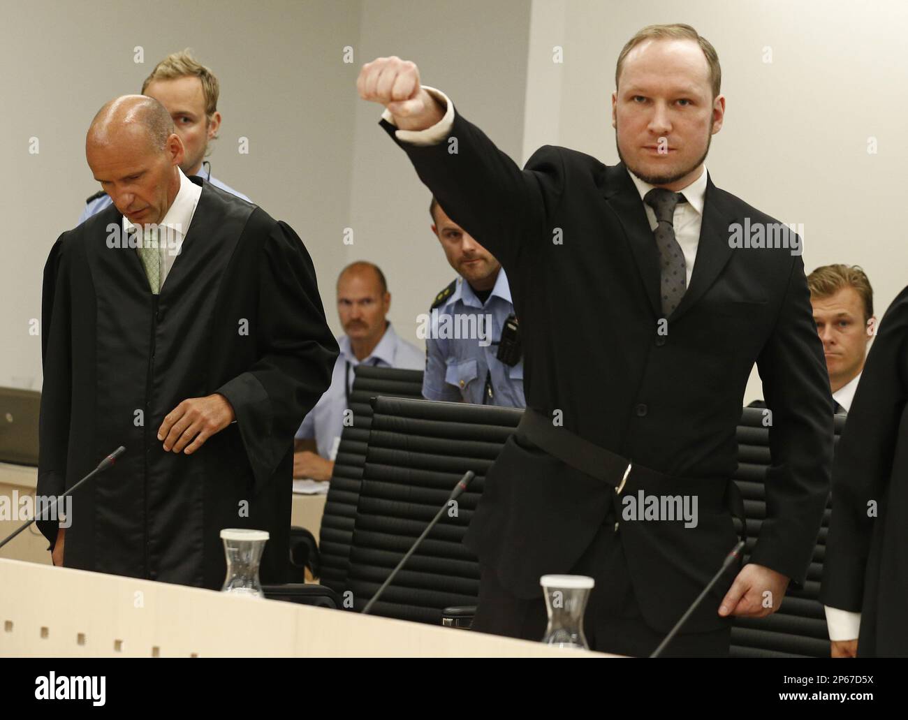Mass murderer Anders Behring Breivik, makes a salute after arrives at ...