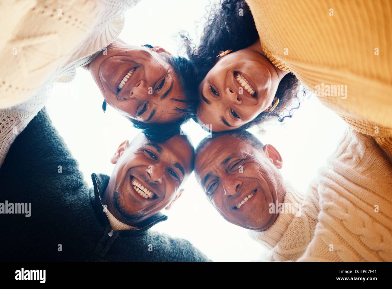 Smile, huddle and portrait of a family with support, motivation and ...