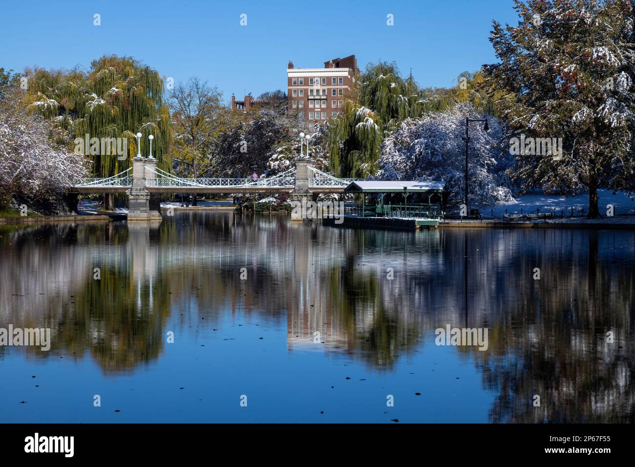 Early Autumn snow at Boston's Public Garden Lagoon, Boston ...
