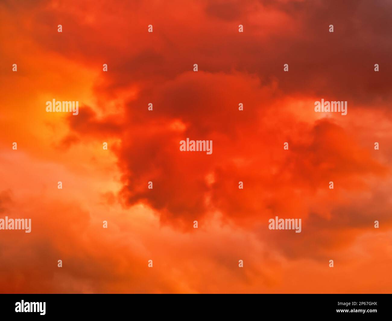 Shift of wind, ragged clouds. Sunset sky colors Stock Photo - Alamy