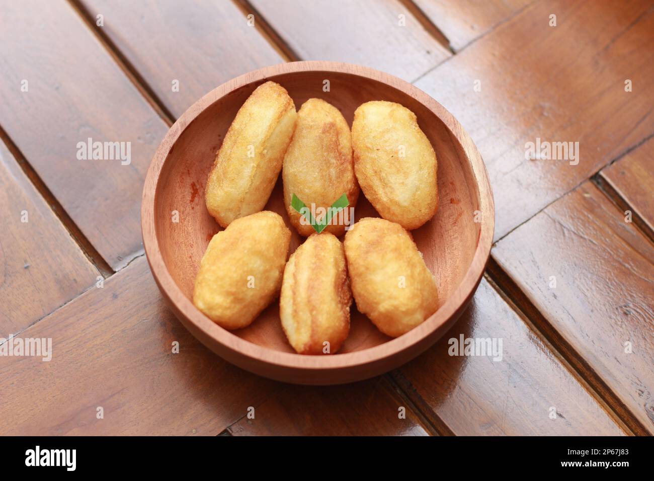 Comro or combro, a traditional Javanese snack made of deep fried grated ...