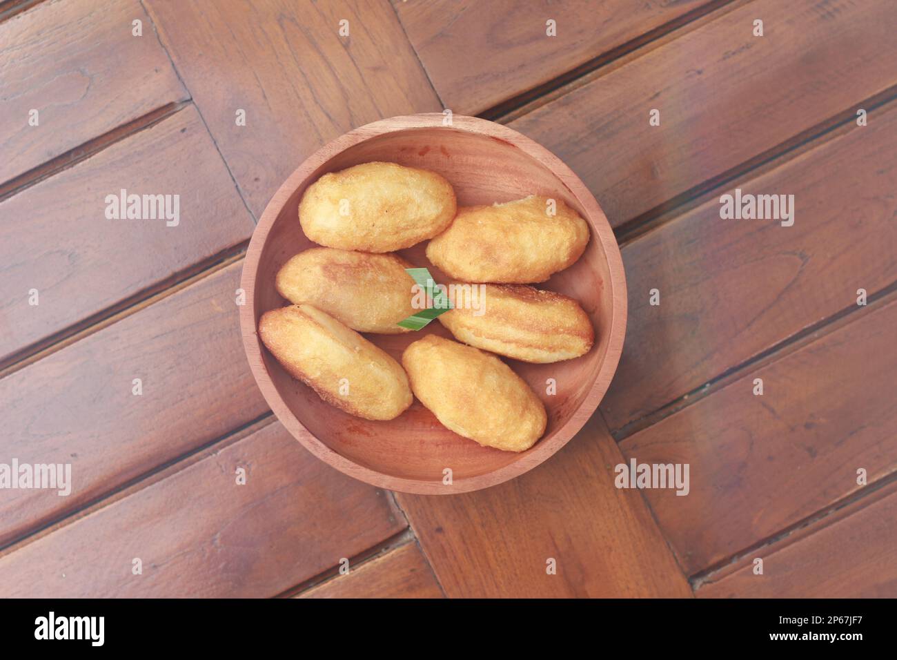 Comro or combro, a traditional Javanese snack made of deep fried grated ...