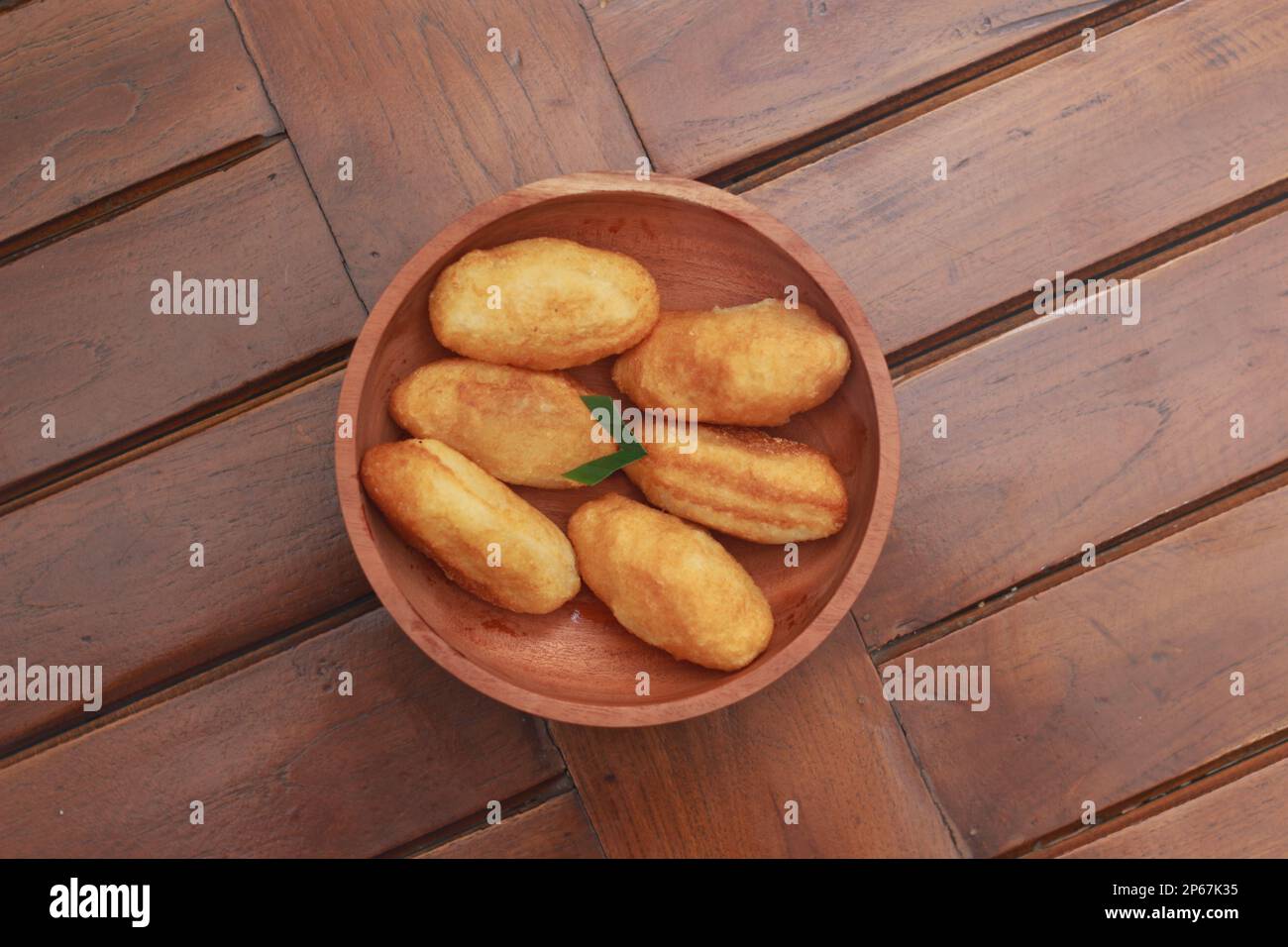 Comro or combro, a traditional Javanese snack made of deep fried grated ...