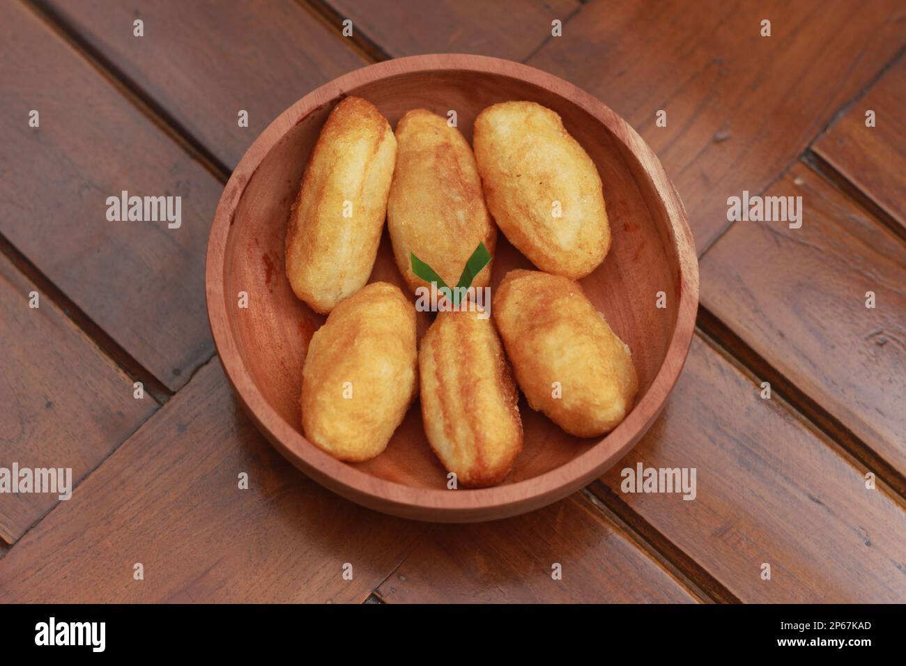 Comro or combro, a traditional Javanese snack made of deep fried grated ...