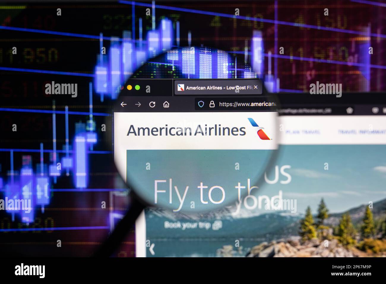 American Airlines company logo on a website with blurry stock market ...
