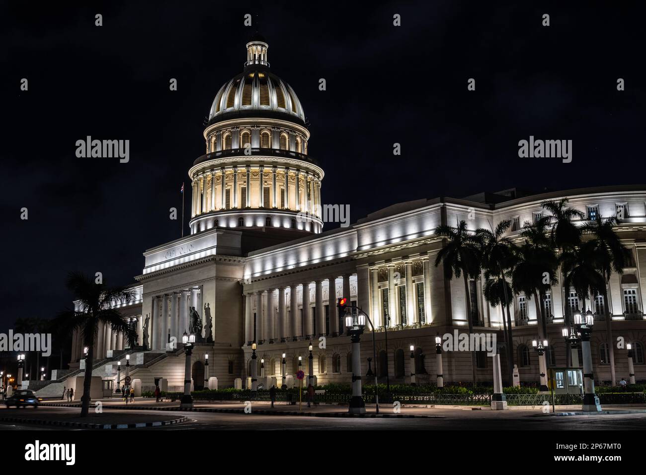 El Capitolio floodlit at night, former Congress building built in 1920s ...