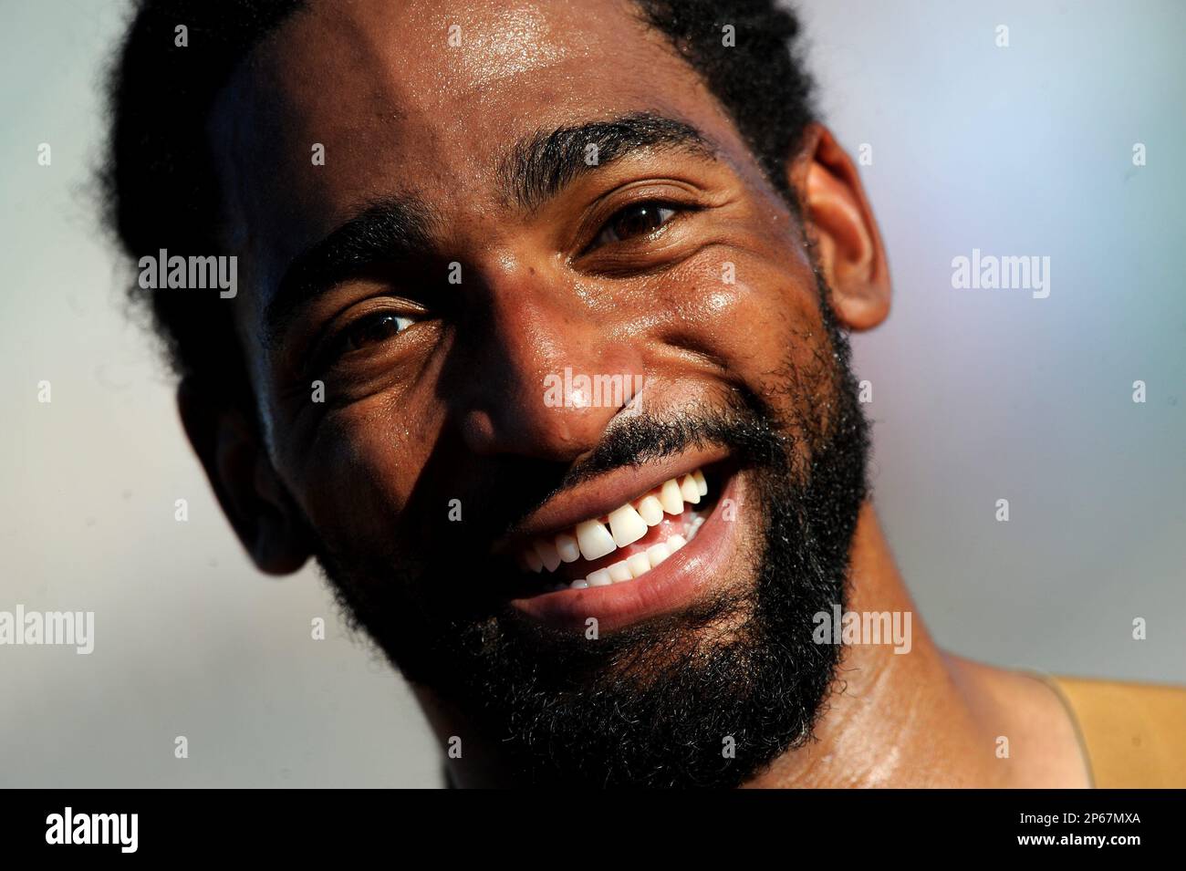 US world champion Jason Richardson smiles after he won men's 110-meter ...