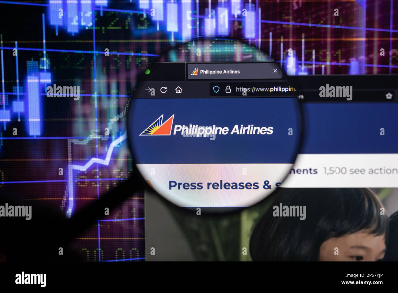 Philippine Airlines company logo on a website with blurry stock market ...