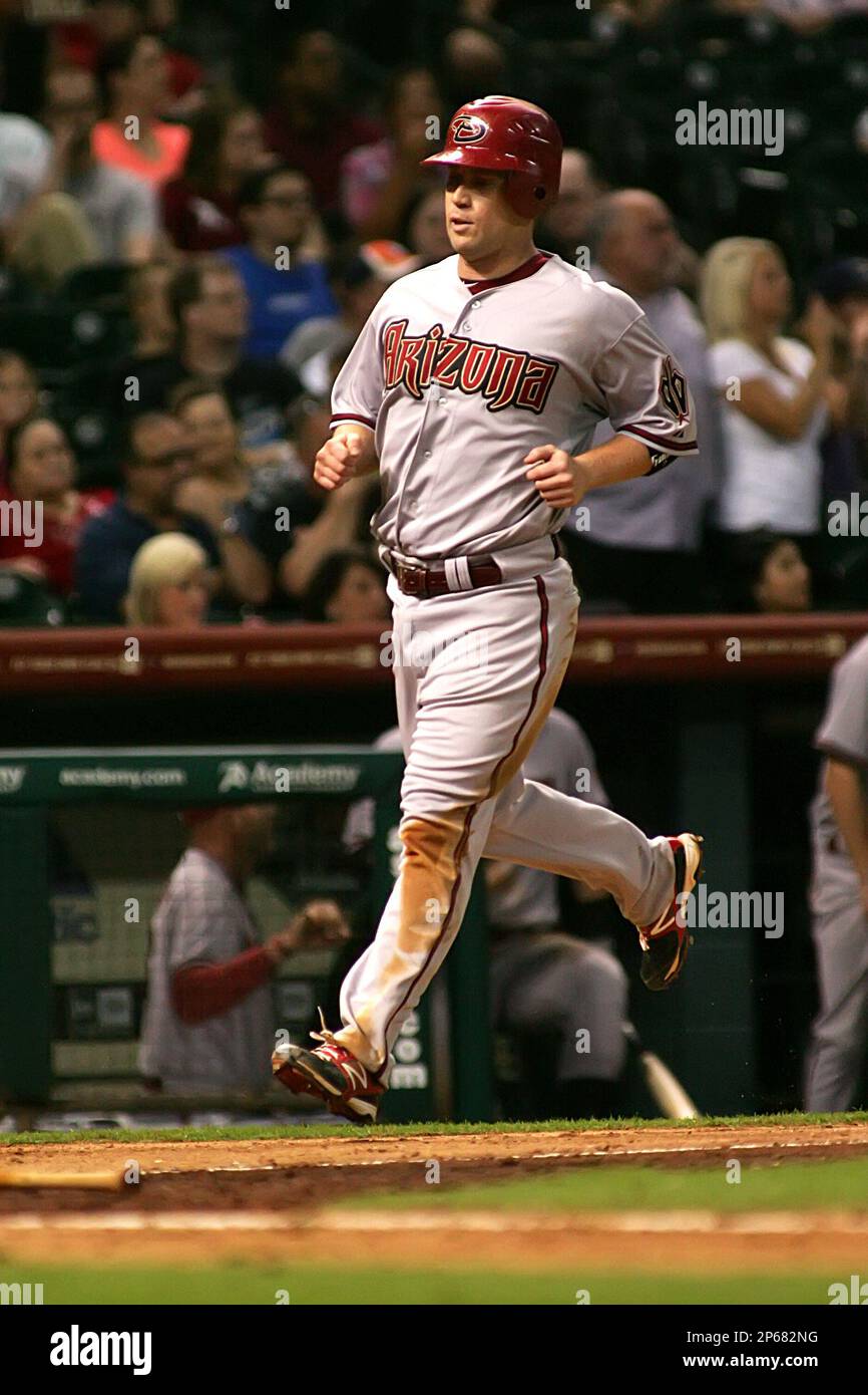 AUG 17 2012: Arizona Diamondbacks infielder Aaron Hill #2 crosses home ...