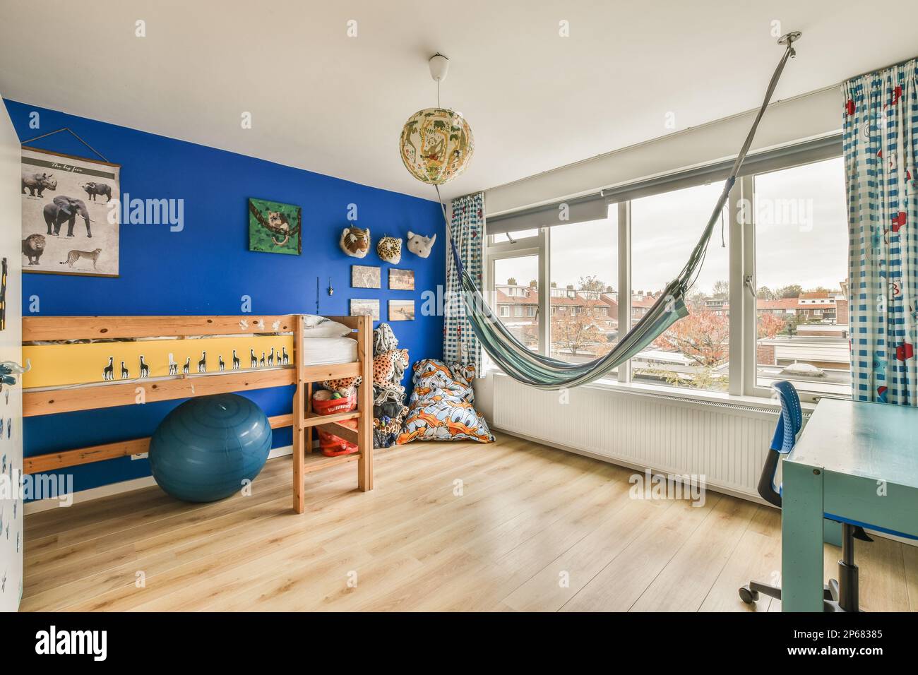 Amsterdam, Netherlands - 10 April, 2021: a kid's room with blue walls ...