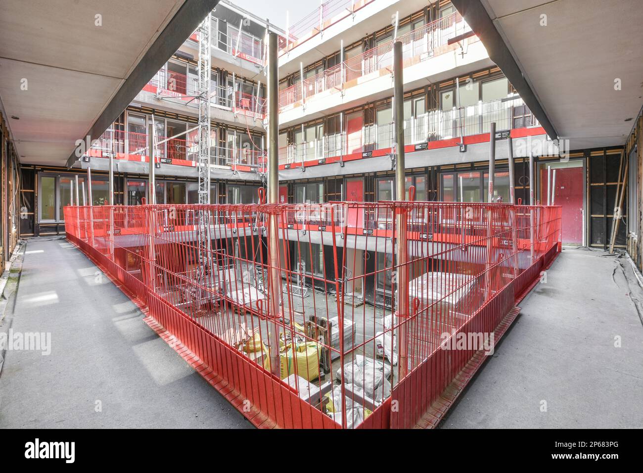the inside of a building that has been painted red and is being used as ...