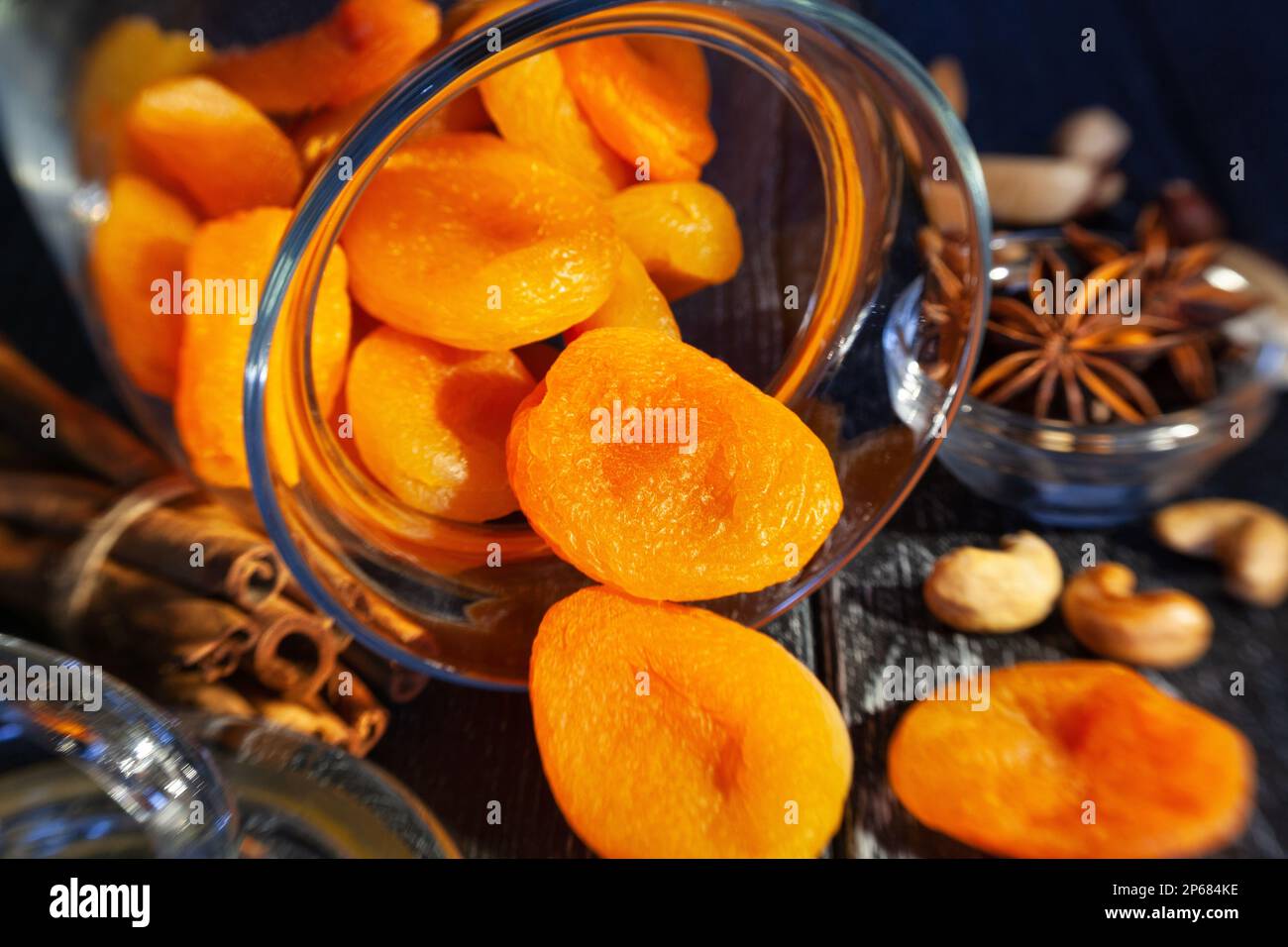 dried apricot on wood background Stock Photo - Alamy
