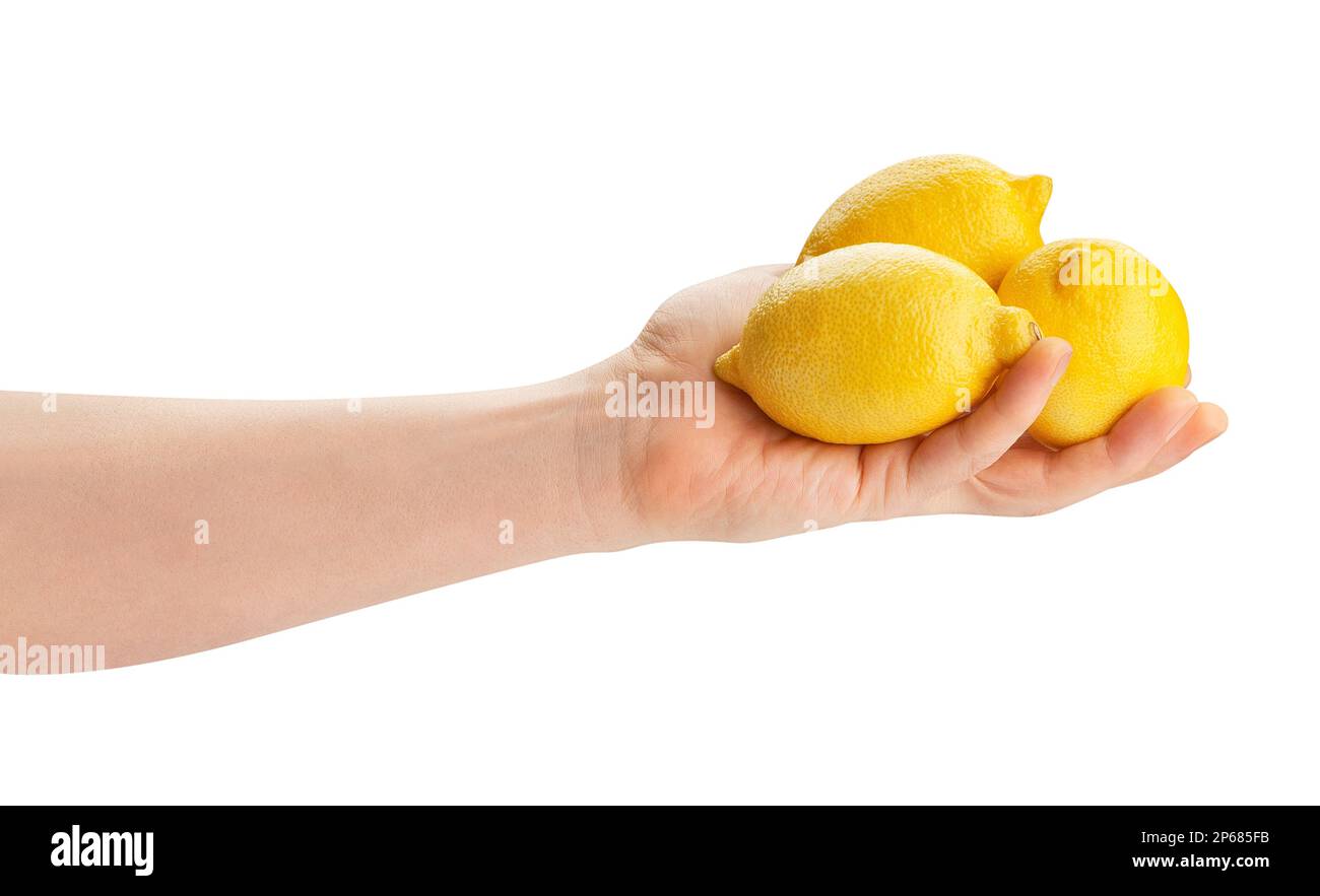 lemon group in hand path isolated on white Stock Photo - Alamy